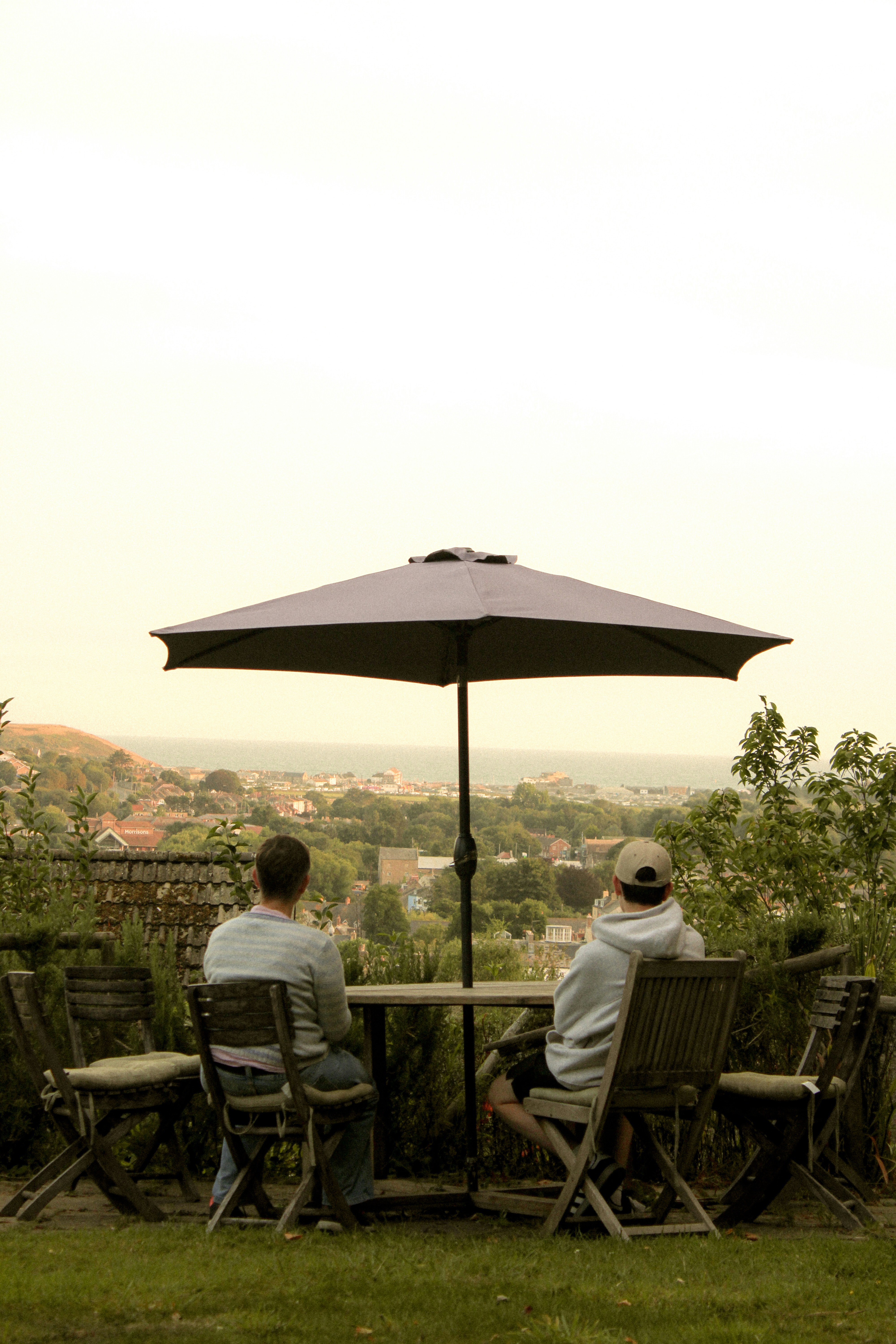 Quiet Terrace by the Umbrella: Friends with a View