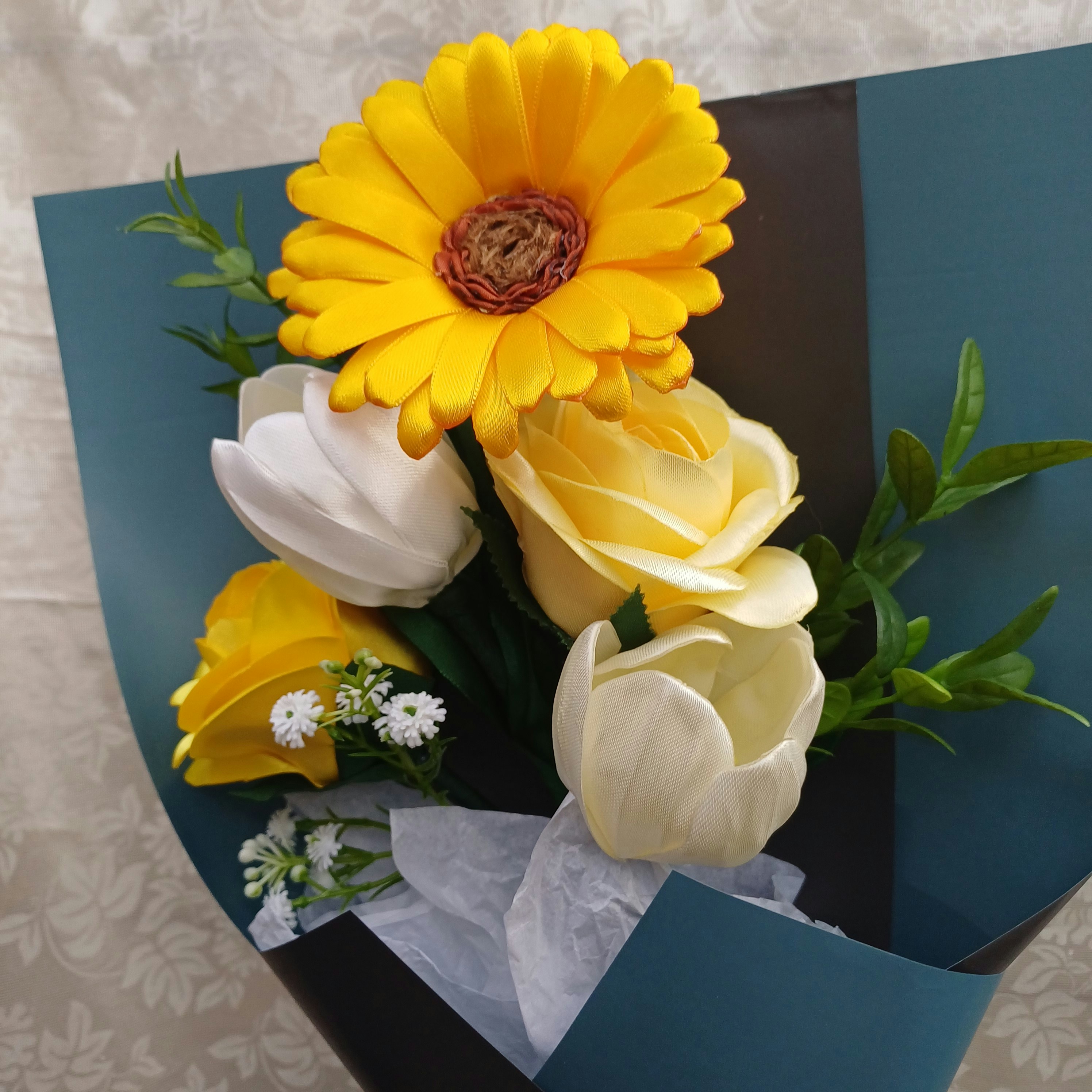 Sunlit Bouquet: Bold Yellow In Bloom Against Painted Backdrop
