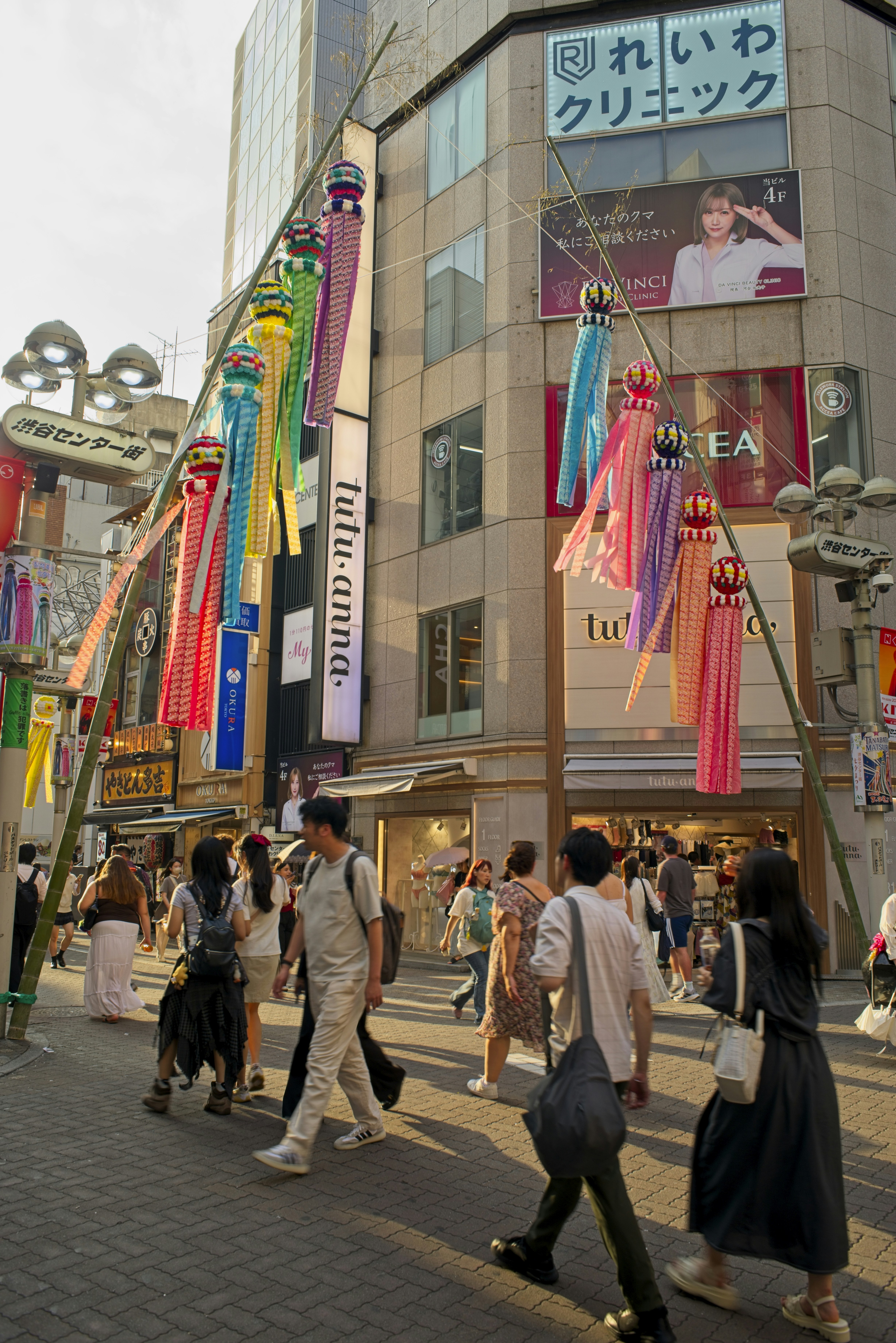 Kite-Tailed Festival in a Bustling City Arcade