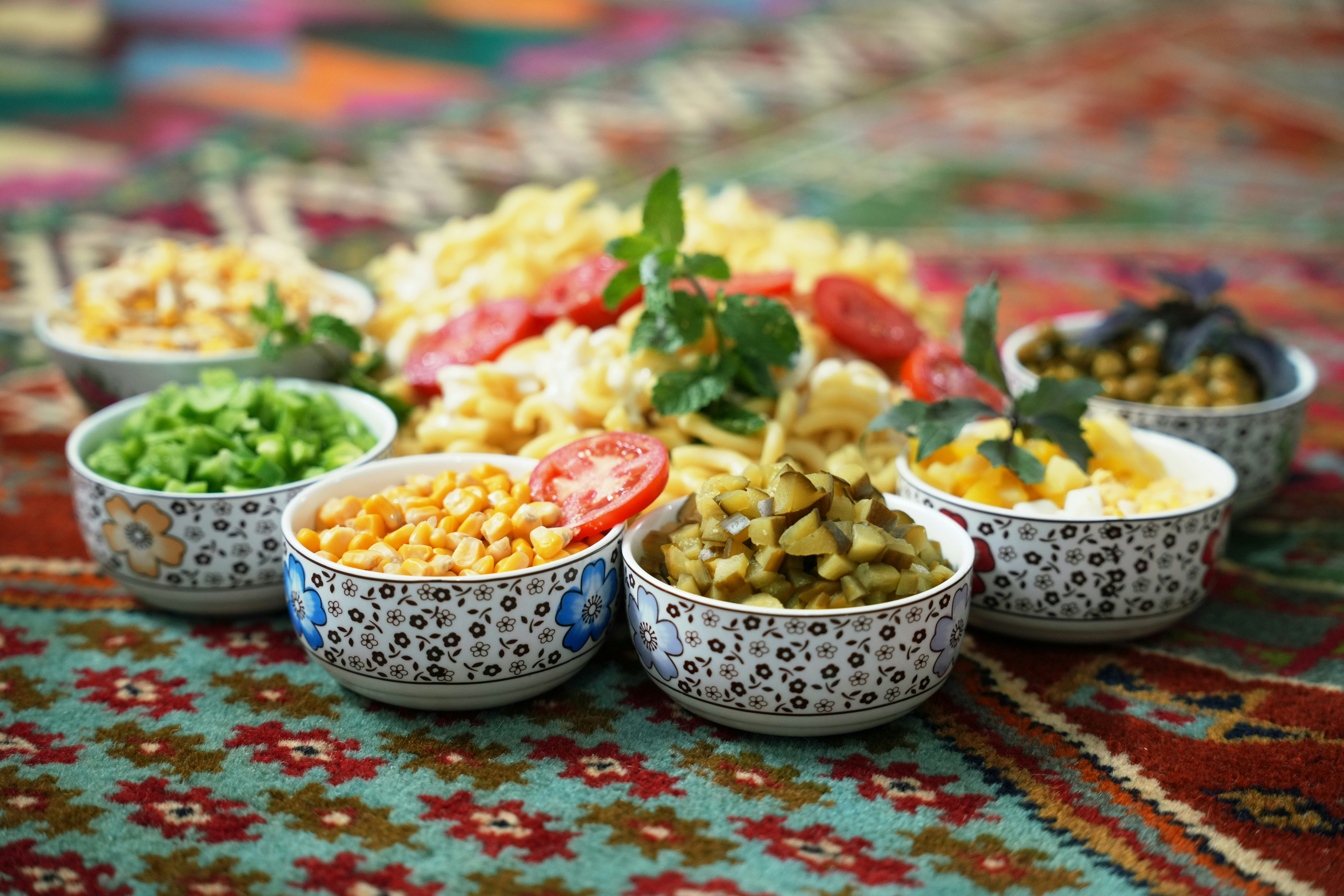 Colorful Mosaic of Spiced Bowls on a Persian Rug