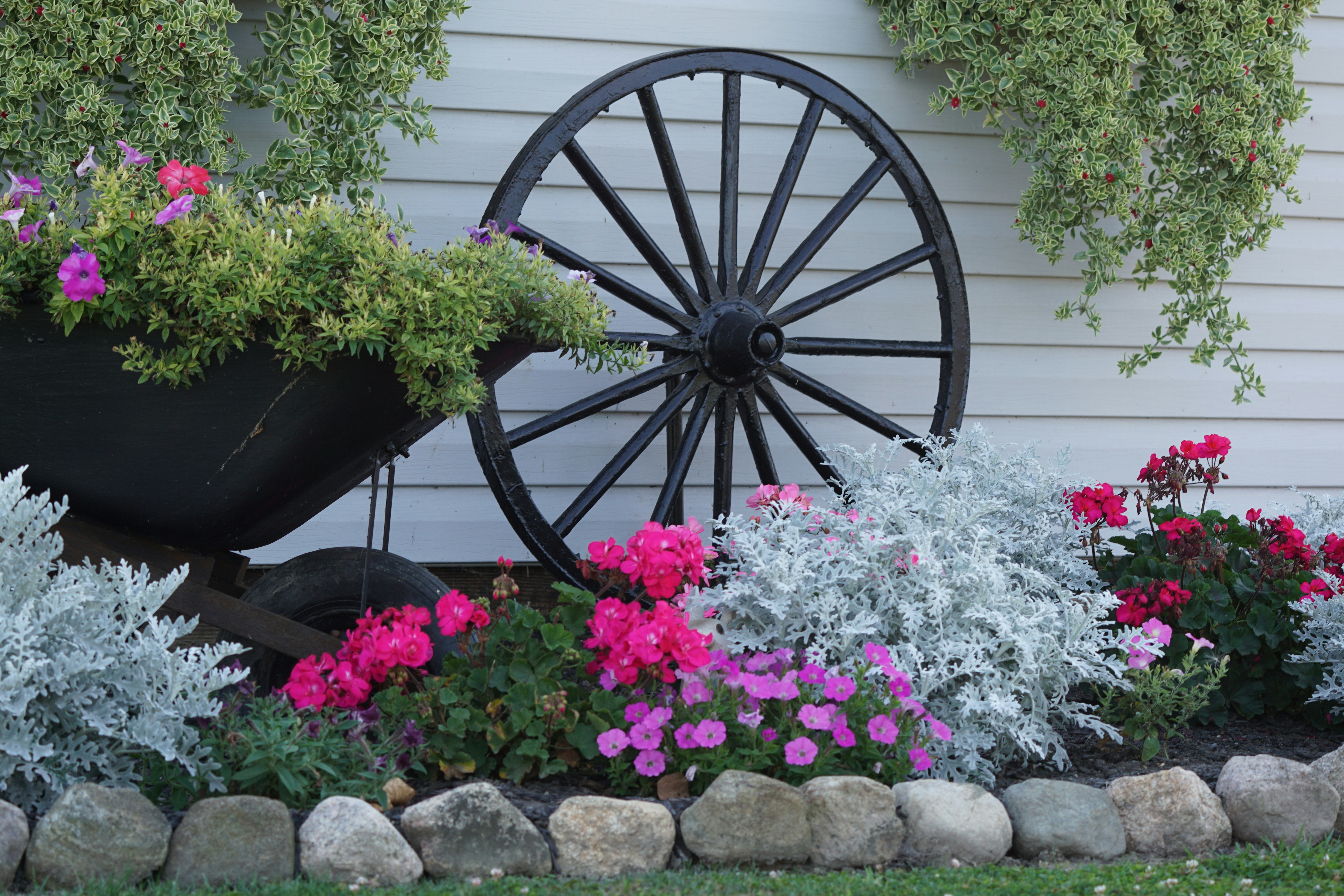 Garden Wheel in Bloom: A Quiet Countryside Composition
