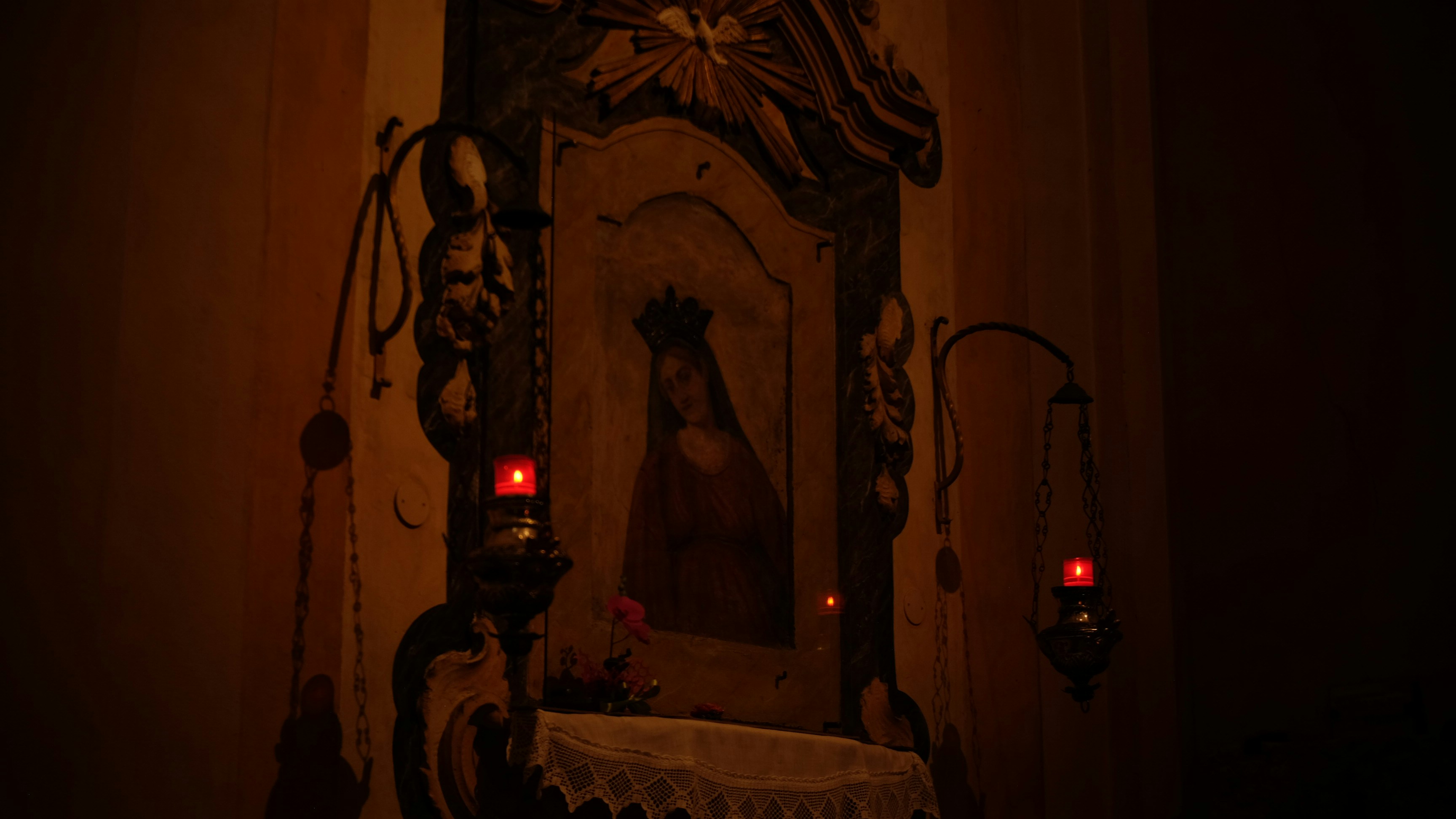 Candlelit Shrine Portrait in a Dim Chapel