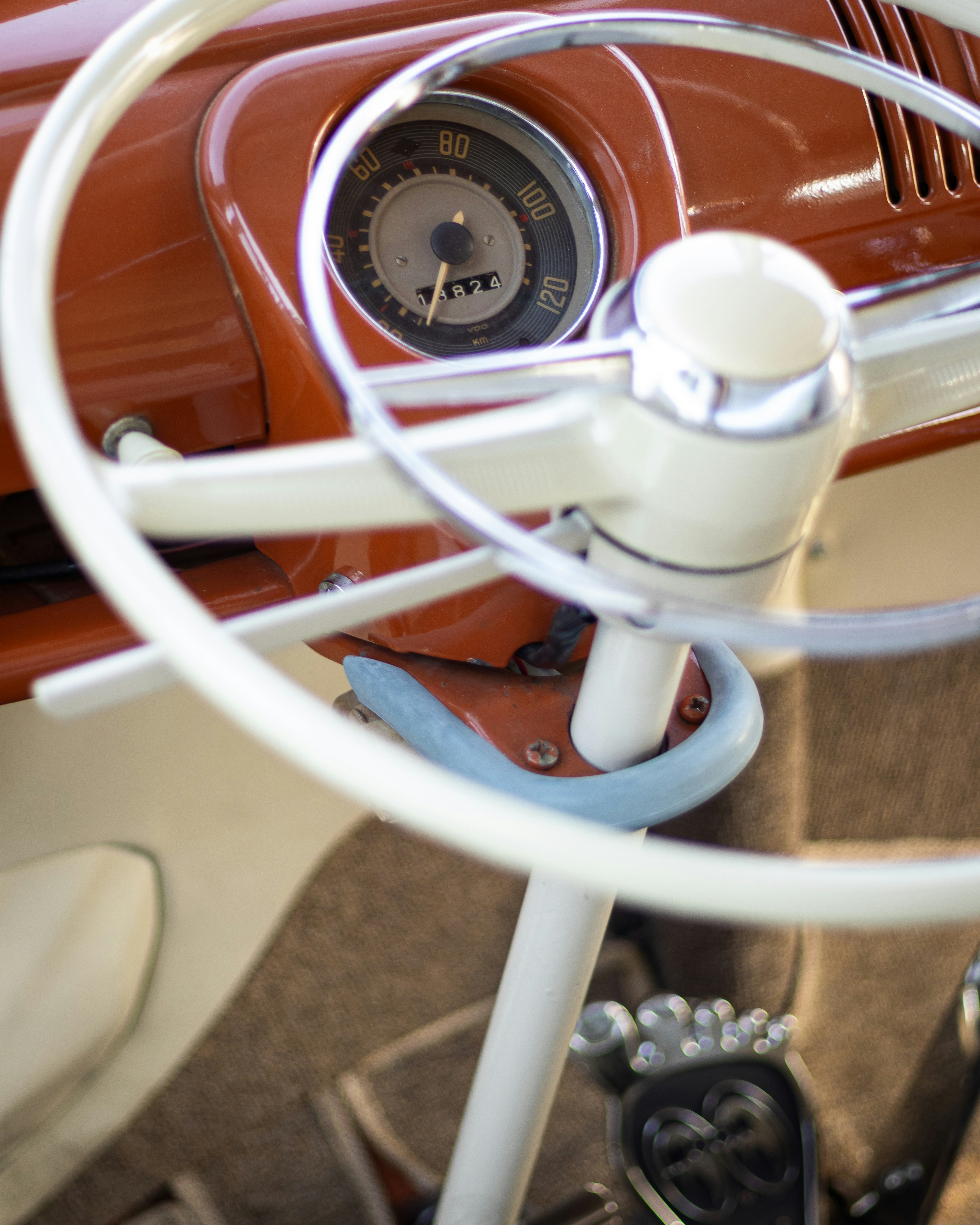 Steering Wheel and Vintage Dash: A Glimpse into Classic Car Interior