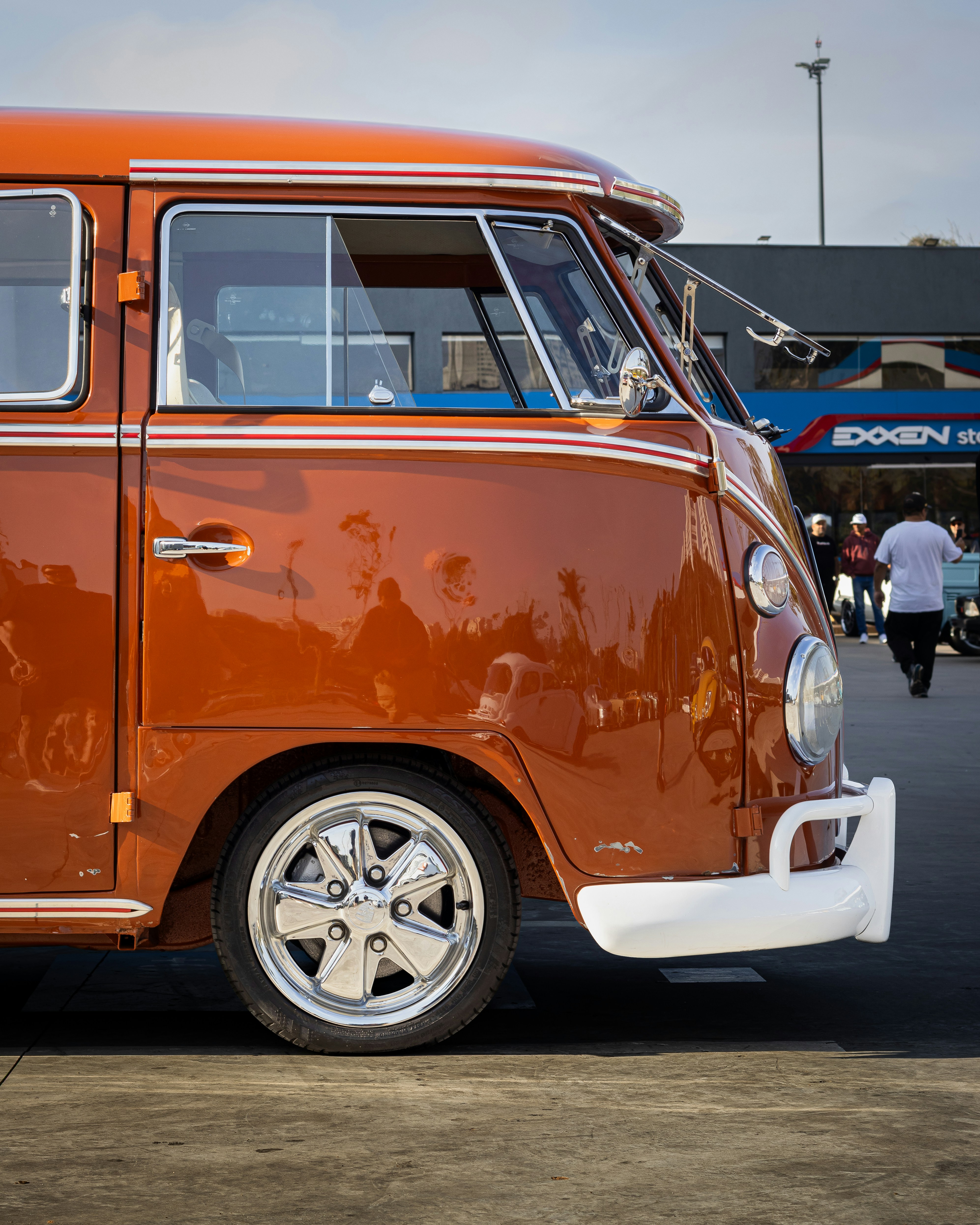 Chrome-Orange Classic: A Vintage VW Cab at Dawn of the Show