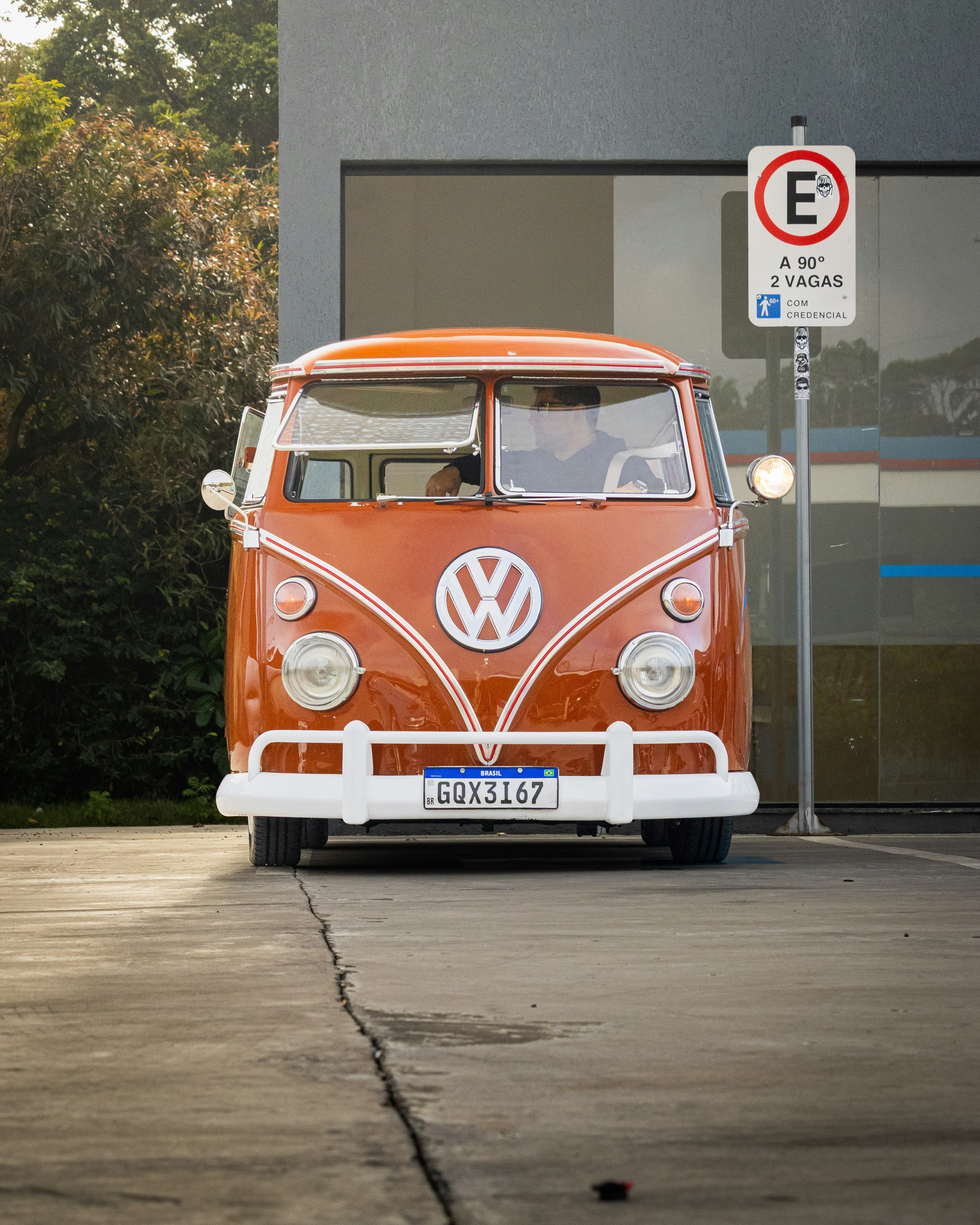 Orange VW Bus at the Edge of the Parking Lot