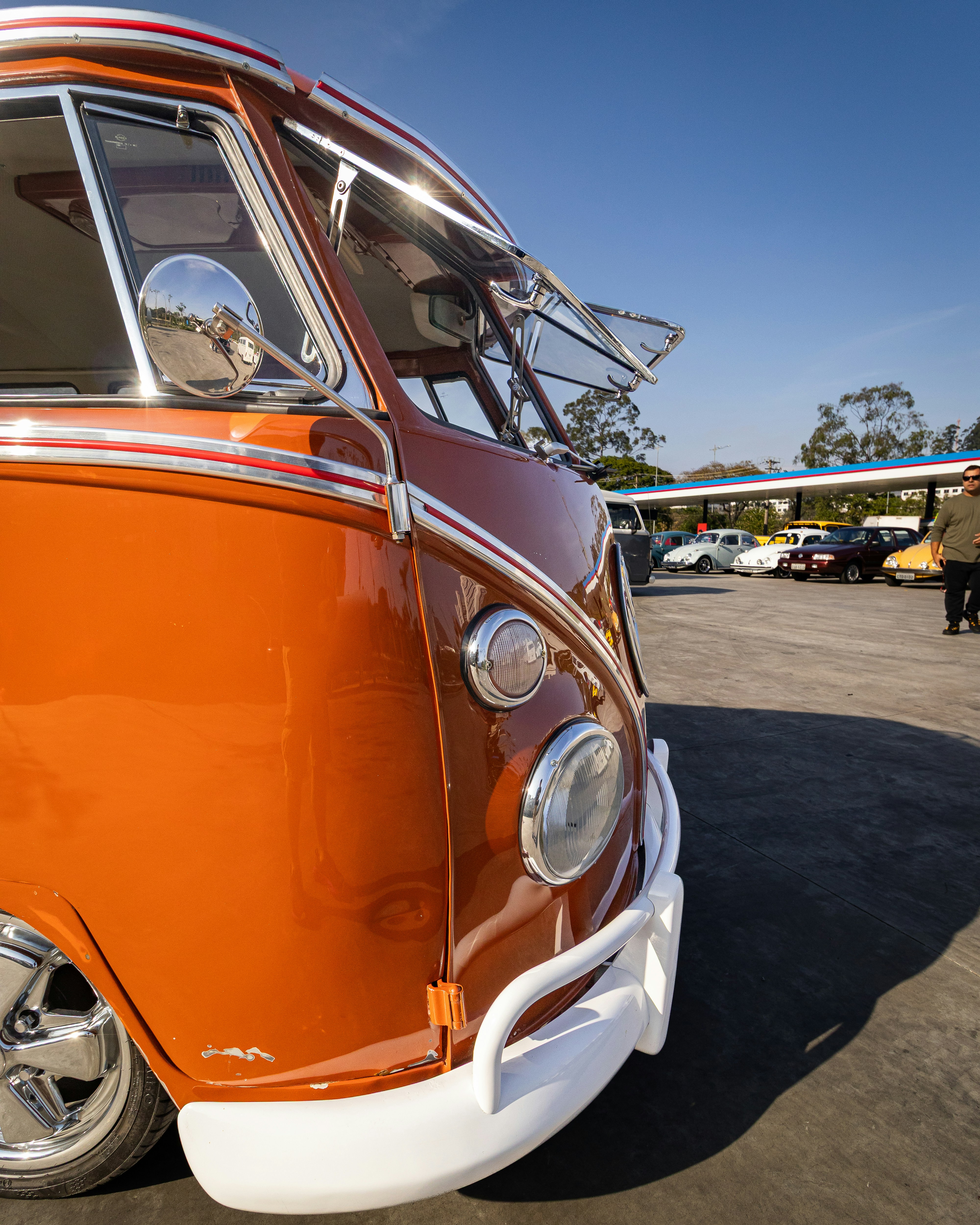 Orange Vintage Volkswagen In Yard of Classic Cars