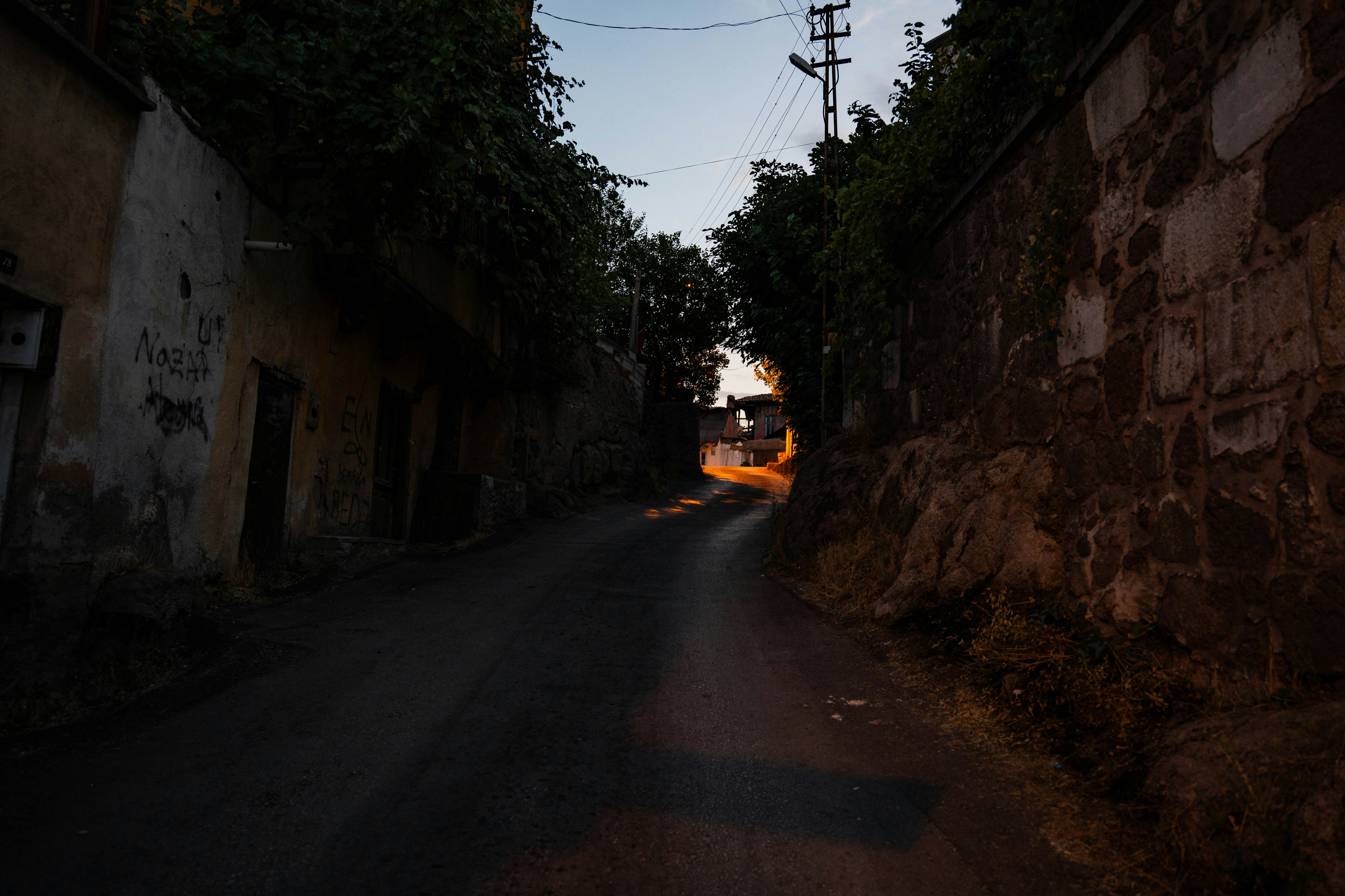 Toward the Warm Light at the End of a Narrow Lane