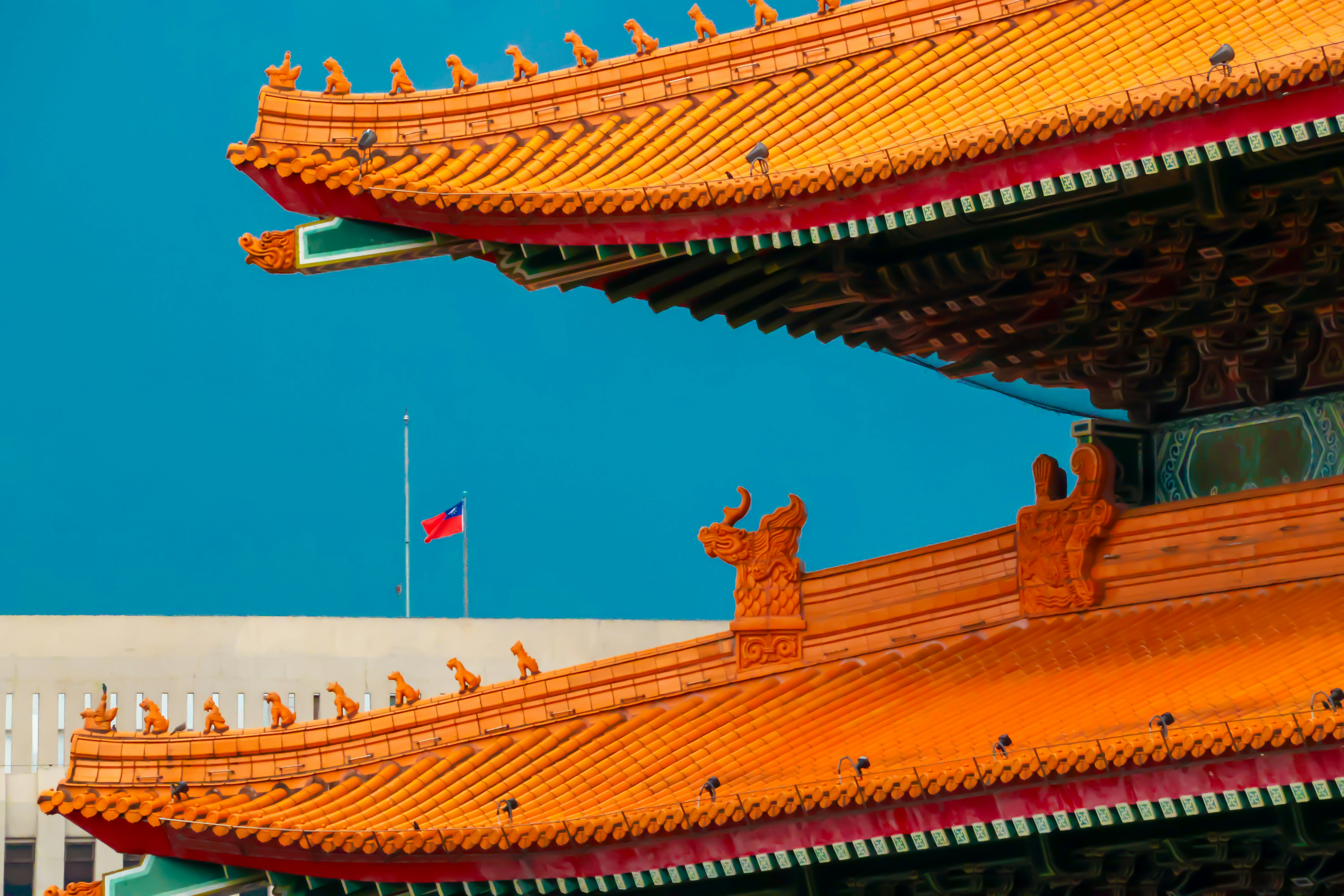 Amber Rooflines: A Corner View of Ornate Chinese Architecture