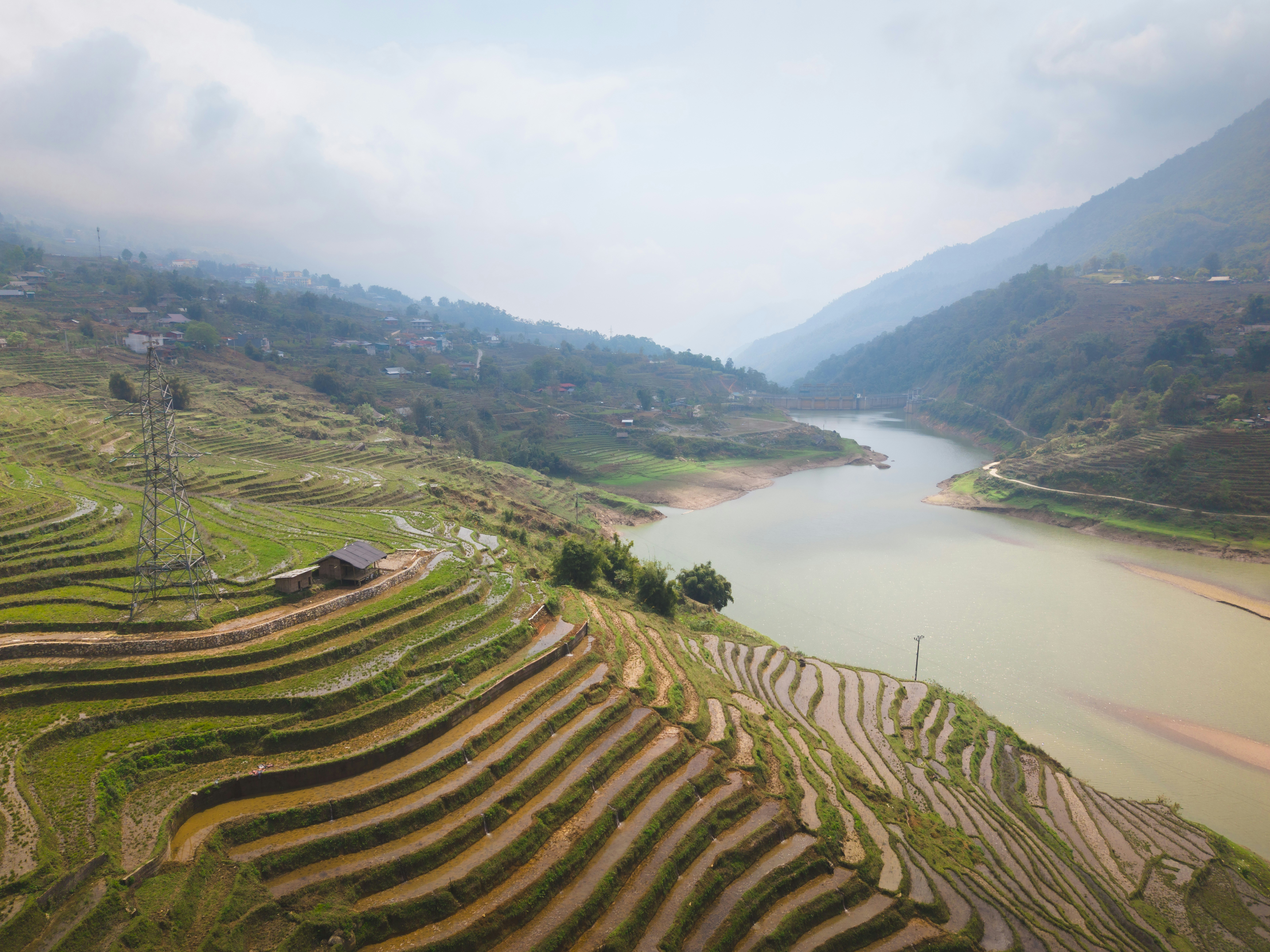 Terraced Riverscape: A Quiet Ribbon of Water Winding Through Green Steps