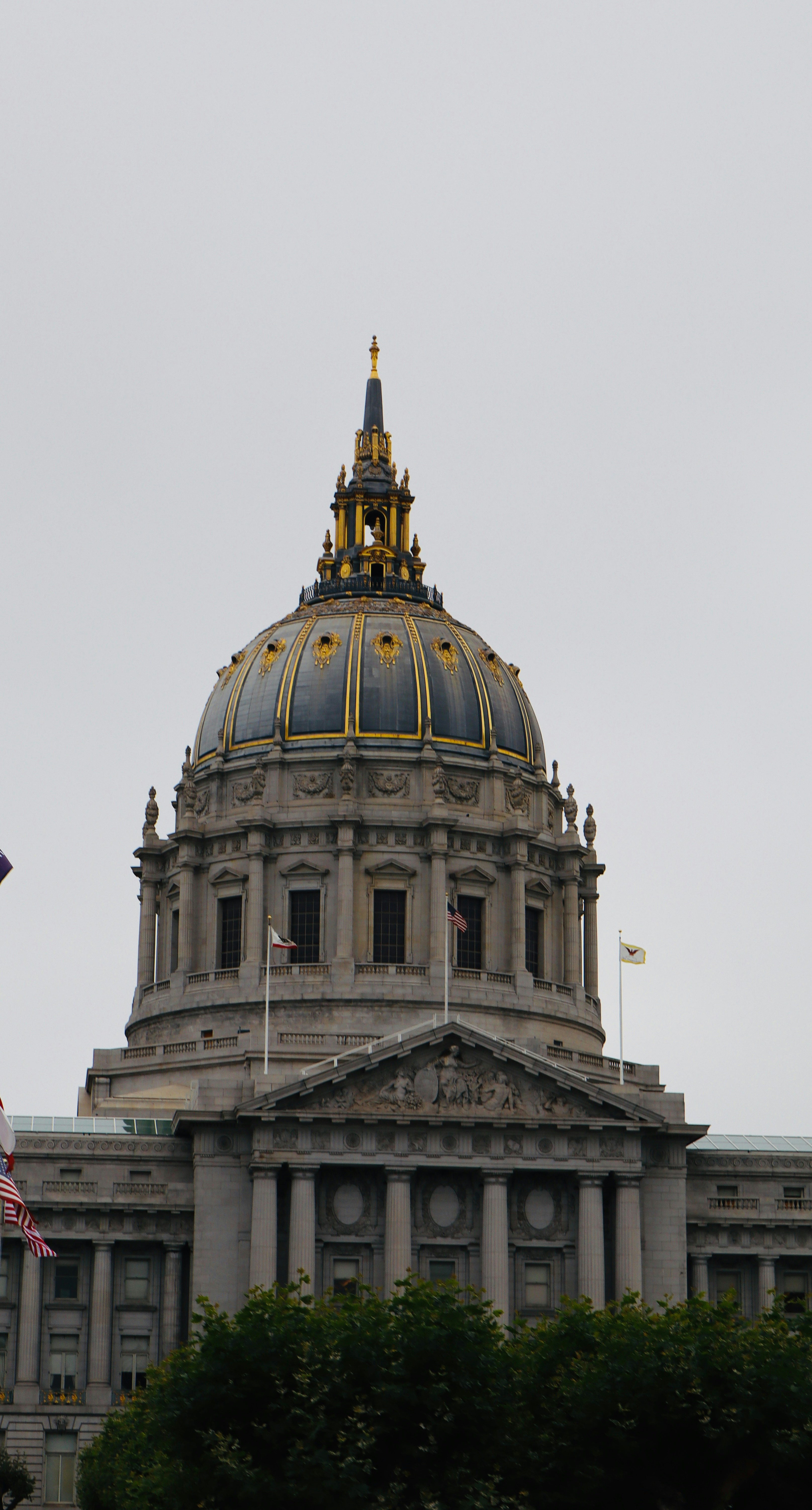 Dome of Stone and Gold Rises Above Civic Facade