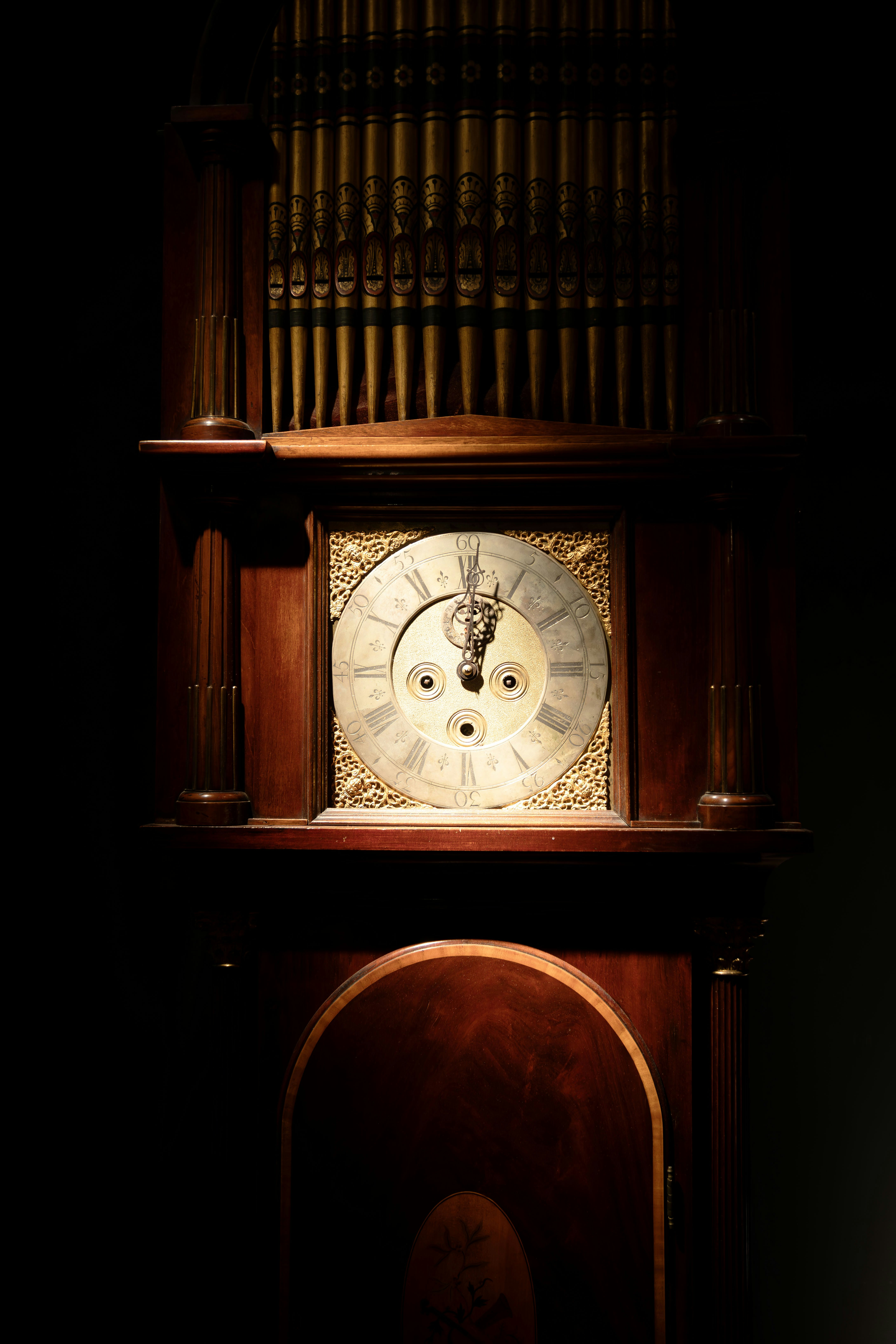 Midnight Keeper: The Silent Chimes of a Wooden Clock
