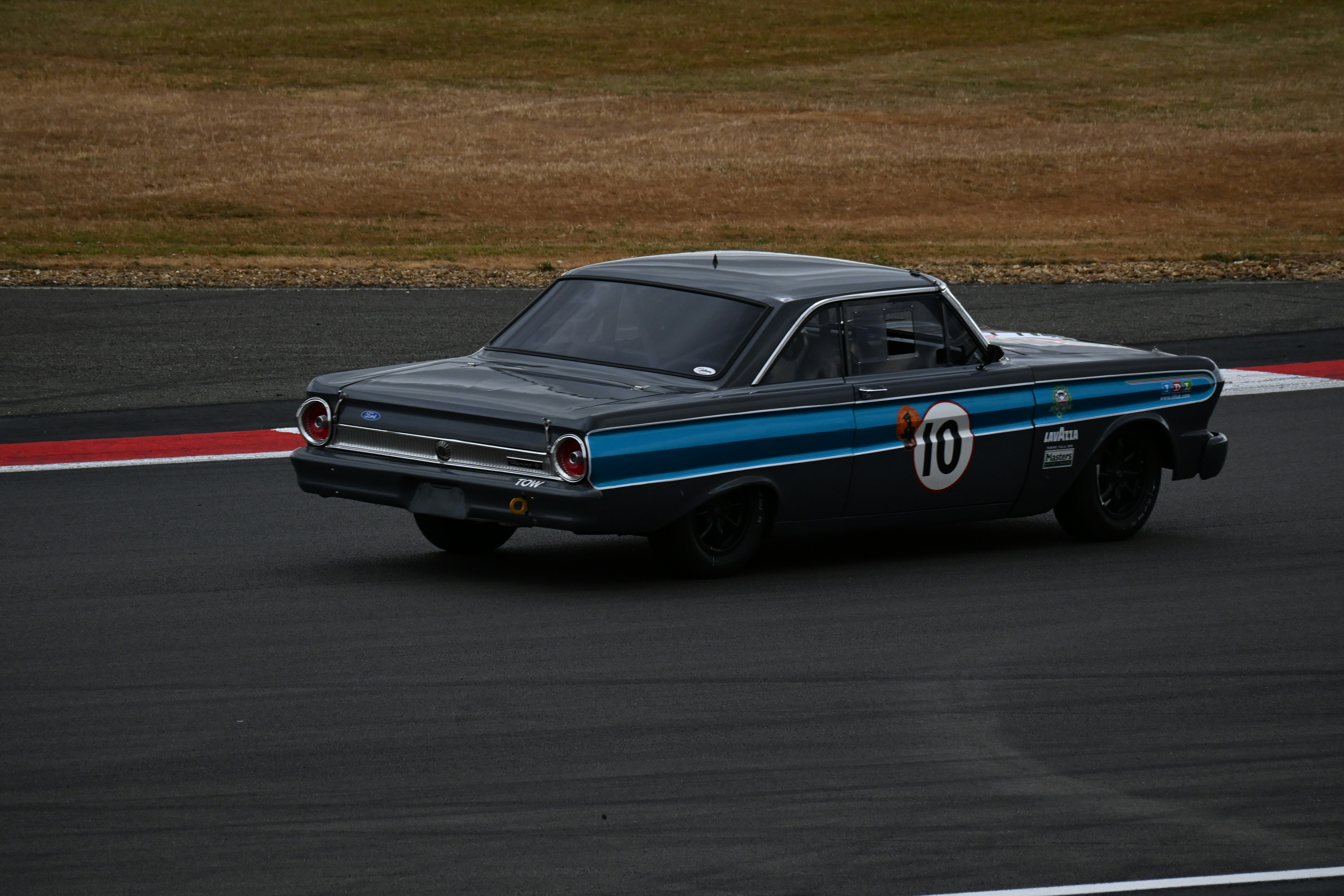 Blue racer: a classic muscle car grips the track