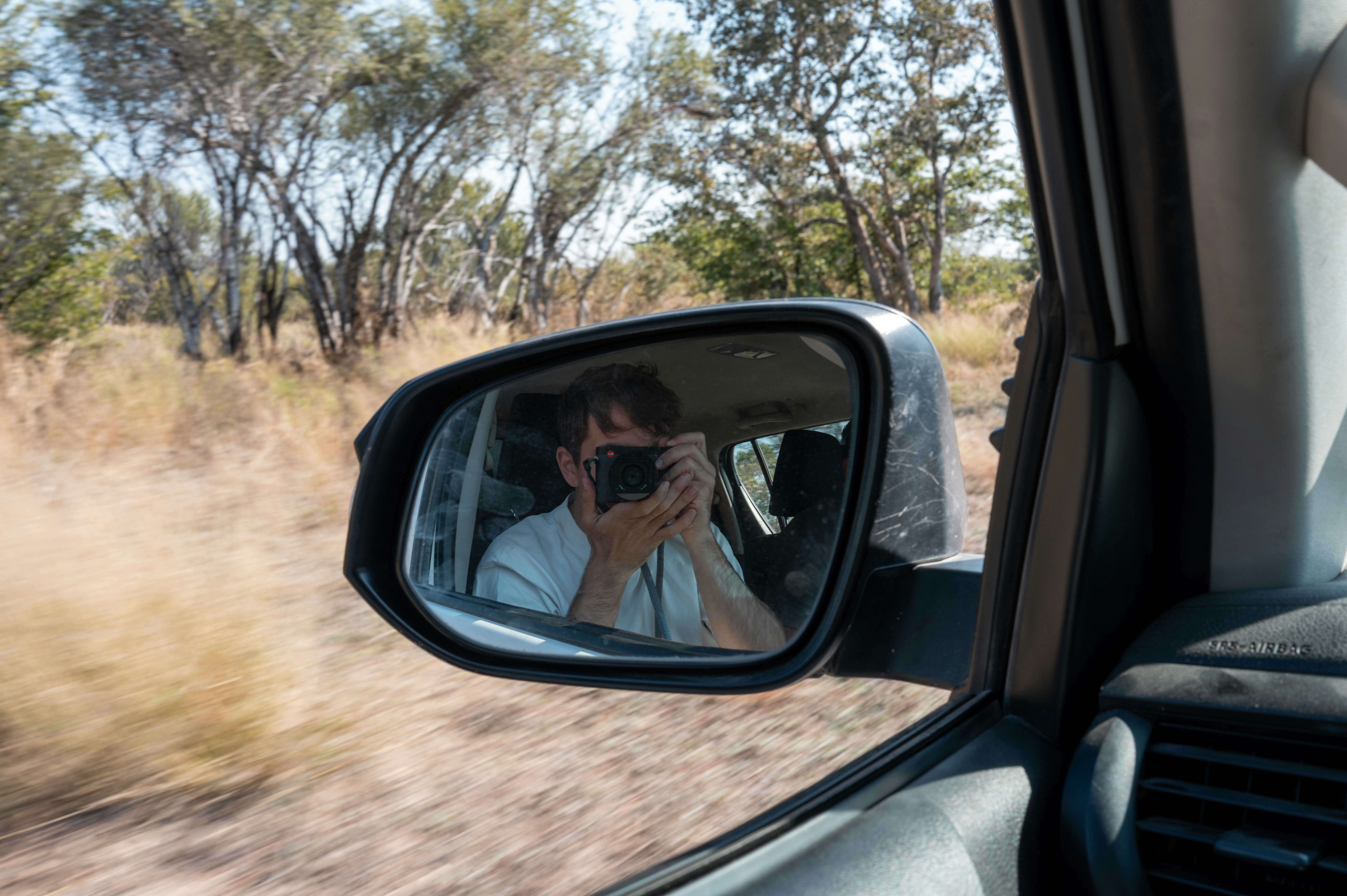 Rear-View Mirror Portrait: The Self Shot on the Road