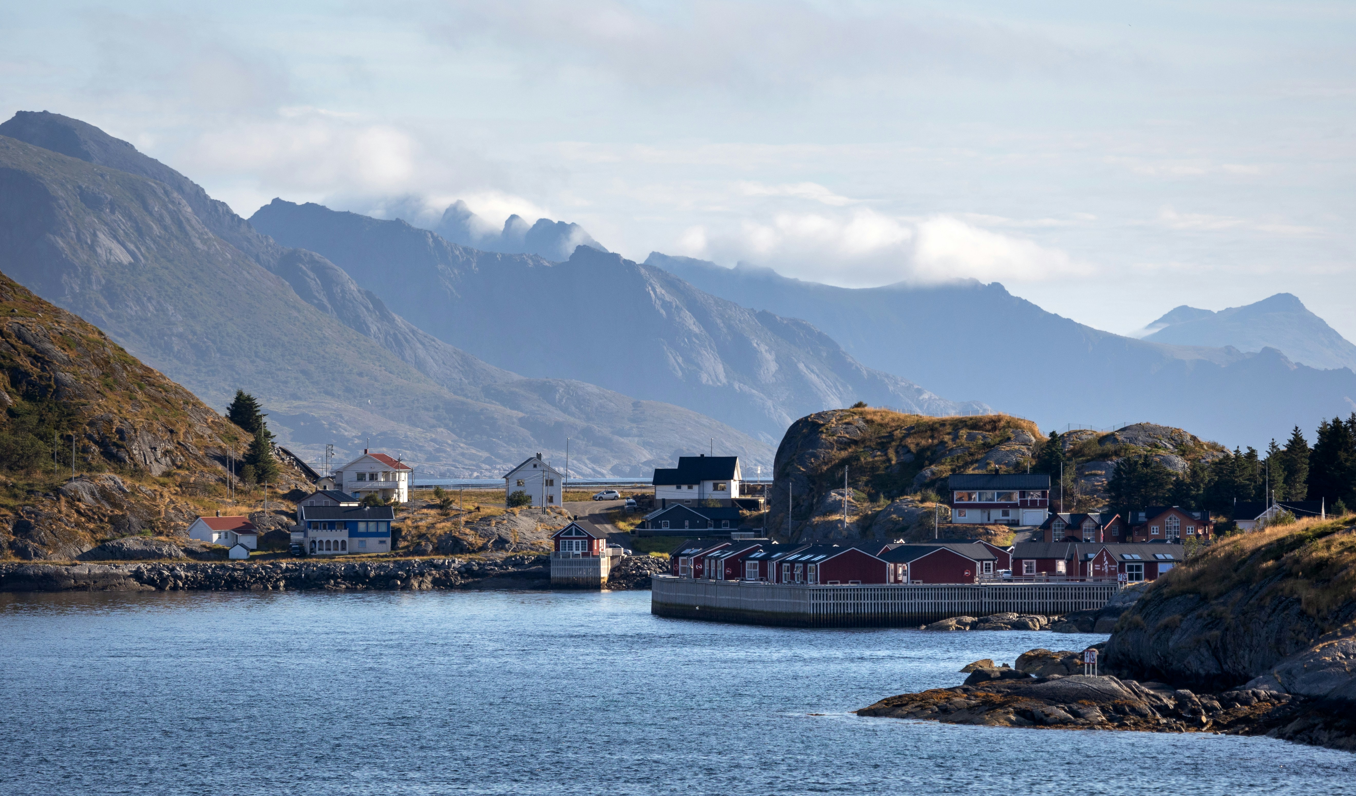 Harbor Village at the Foot of Rugged Peaks