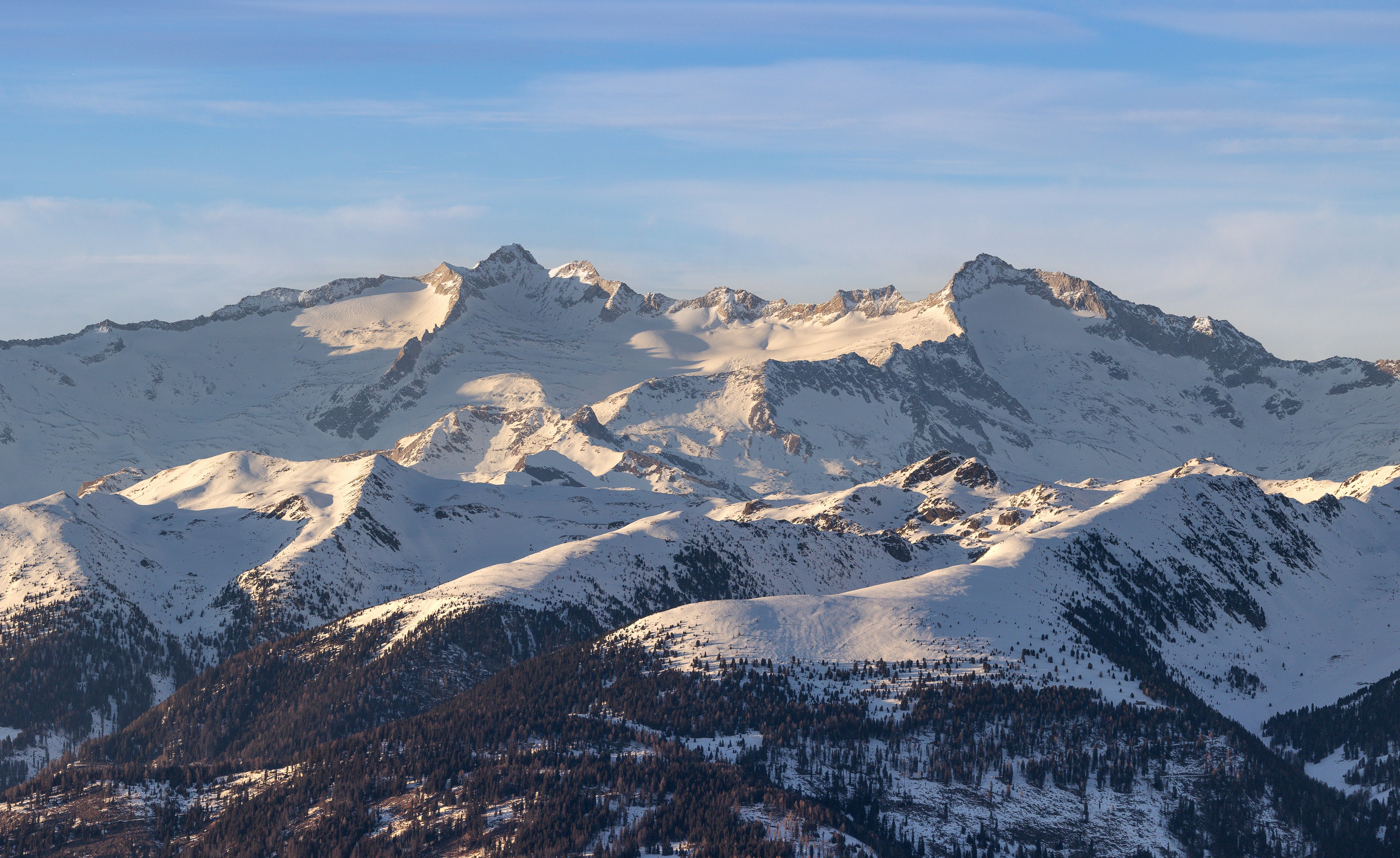 Snow‑kissed Ridge Under a Clear Blue Crest