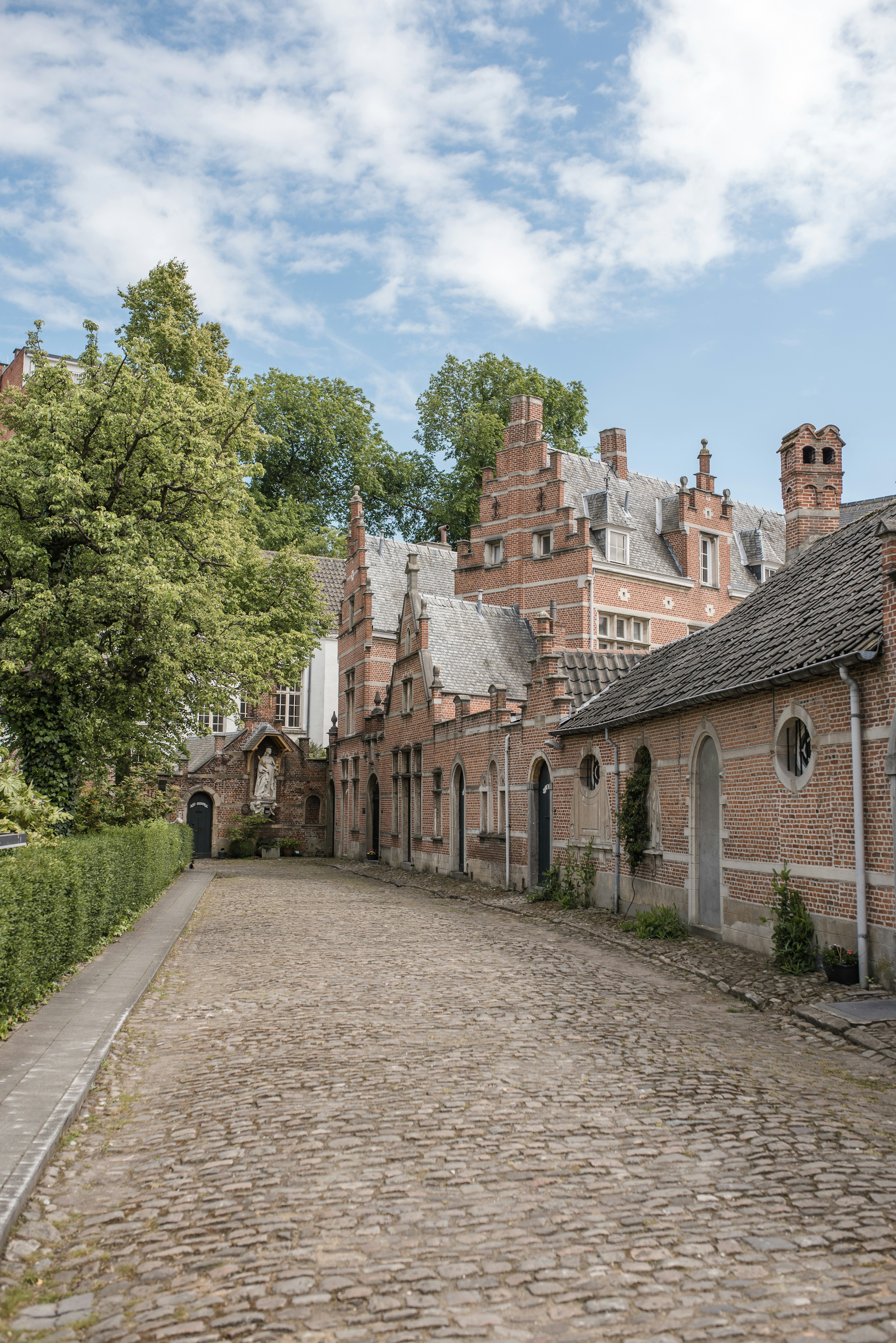 Cobbled Lane to a Brick-Court Retreat