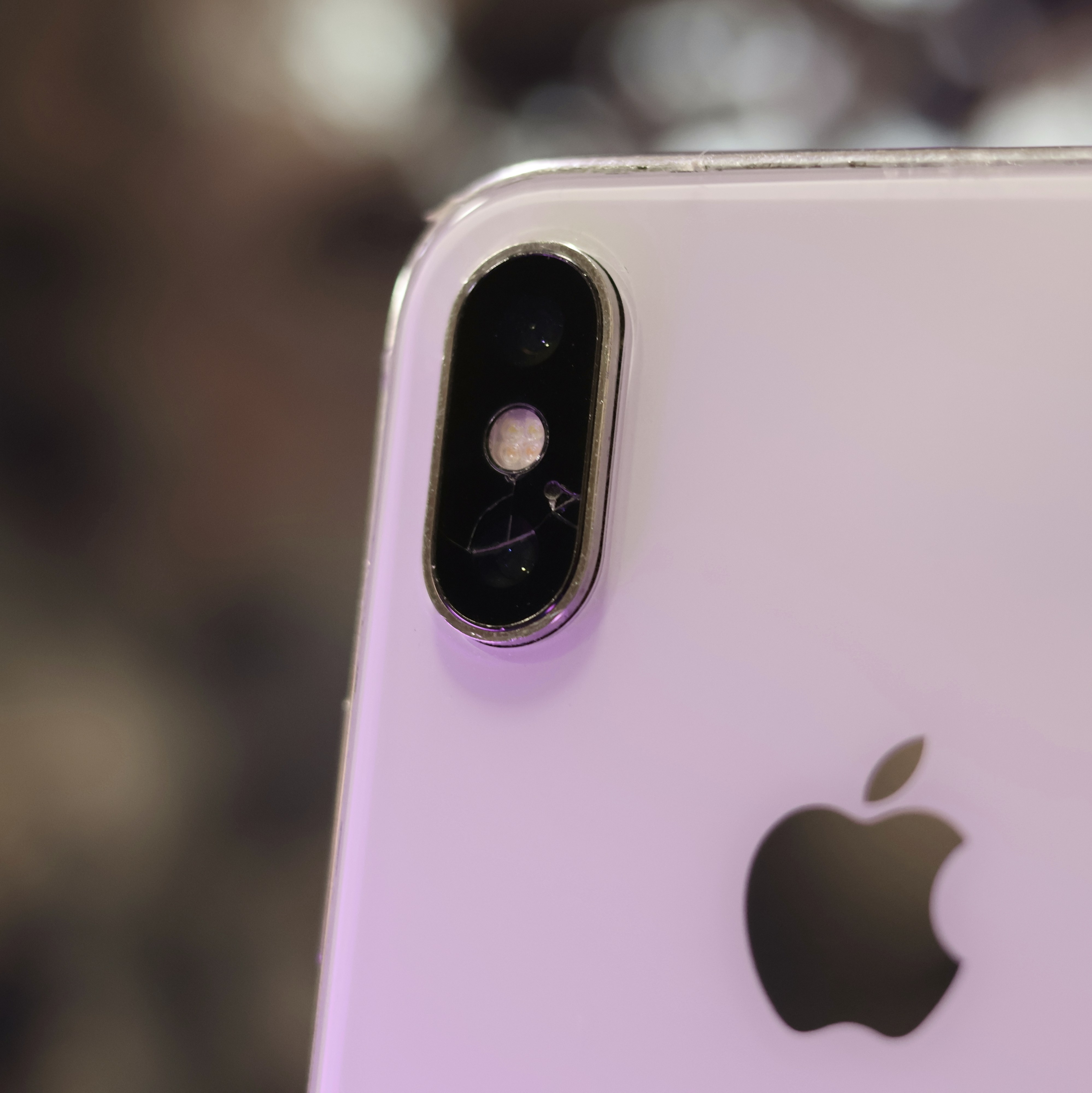 Crystalline Apple: A Pink iPhone Glow on the Camera Bump