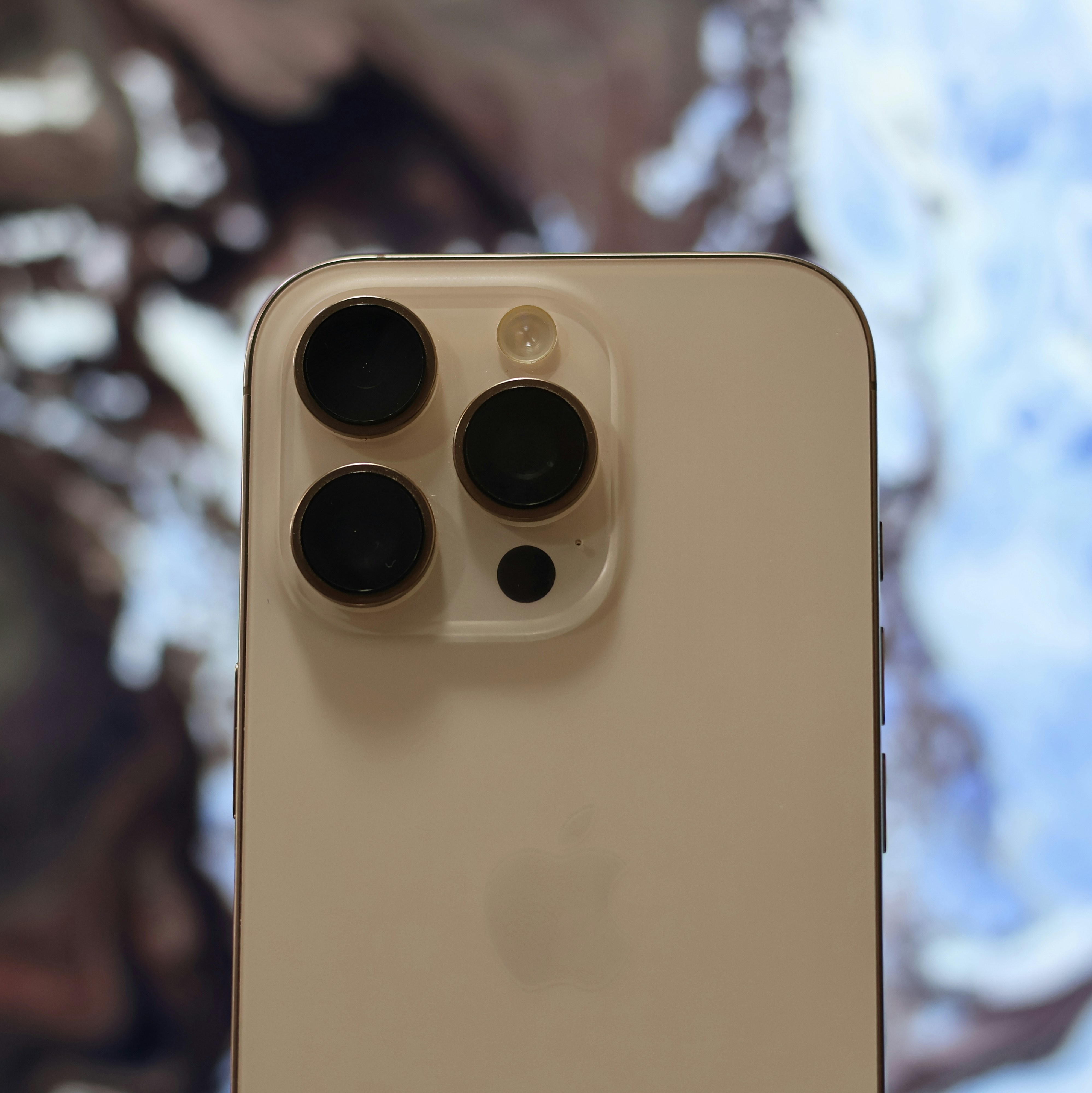Triple-Lens Spotlight: The iPhone Pro Backdrop in Soft Focus