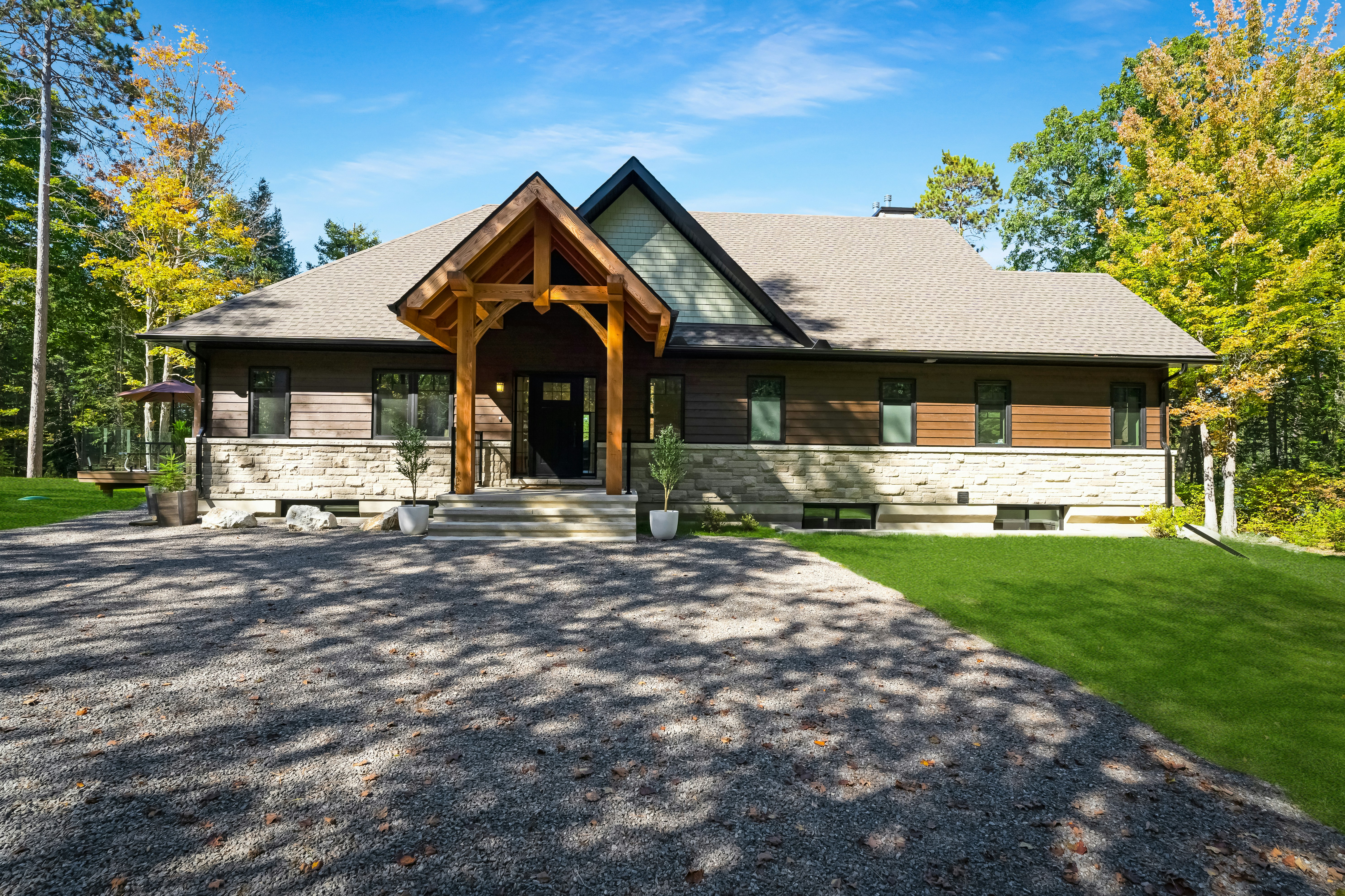 Warm-wooded lodge at the edge of a sunlit forest