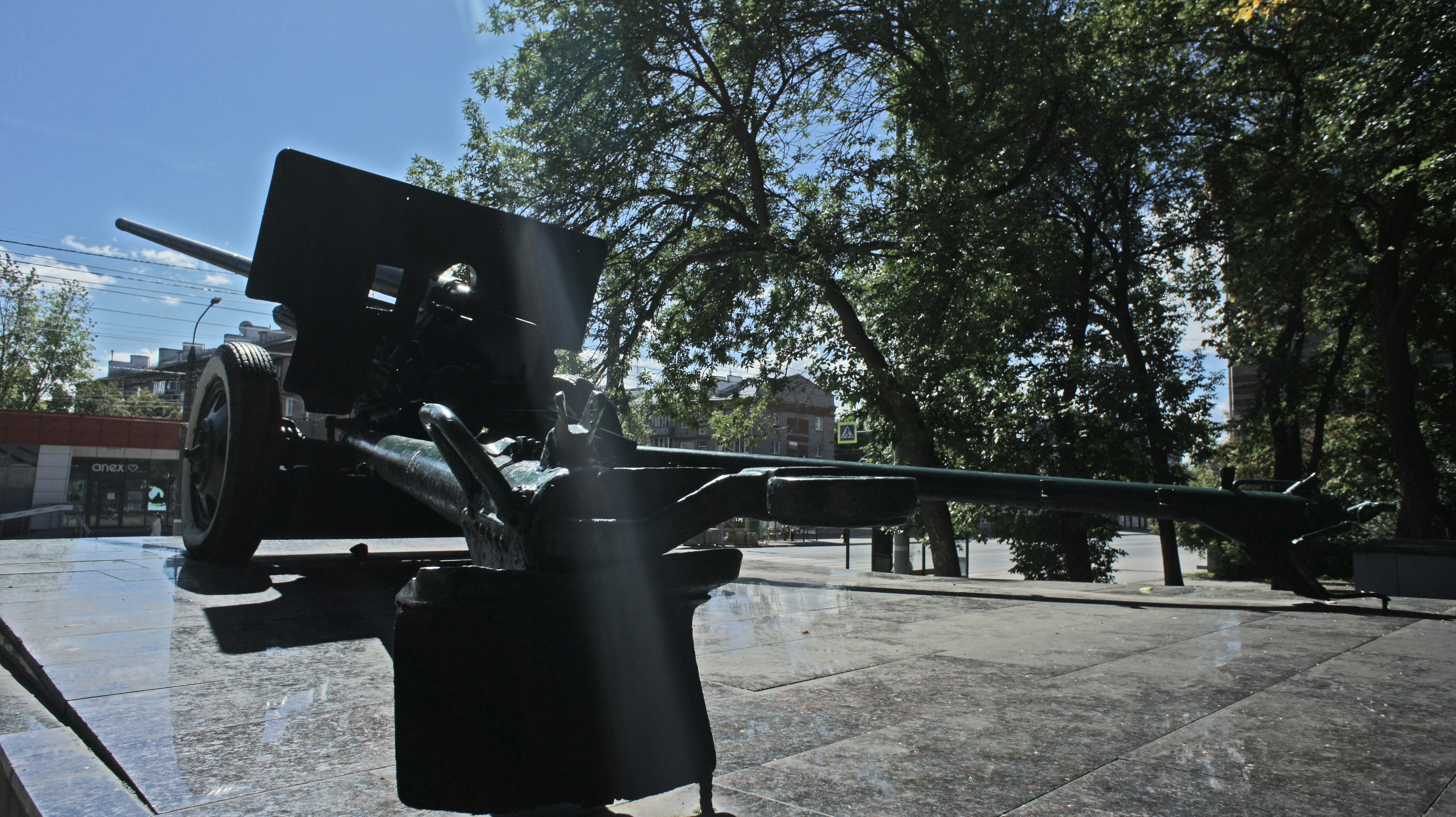 Low-Angle Railgun: A Blurred Sunlit Cannon in the Park