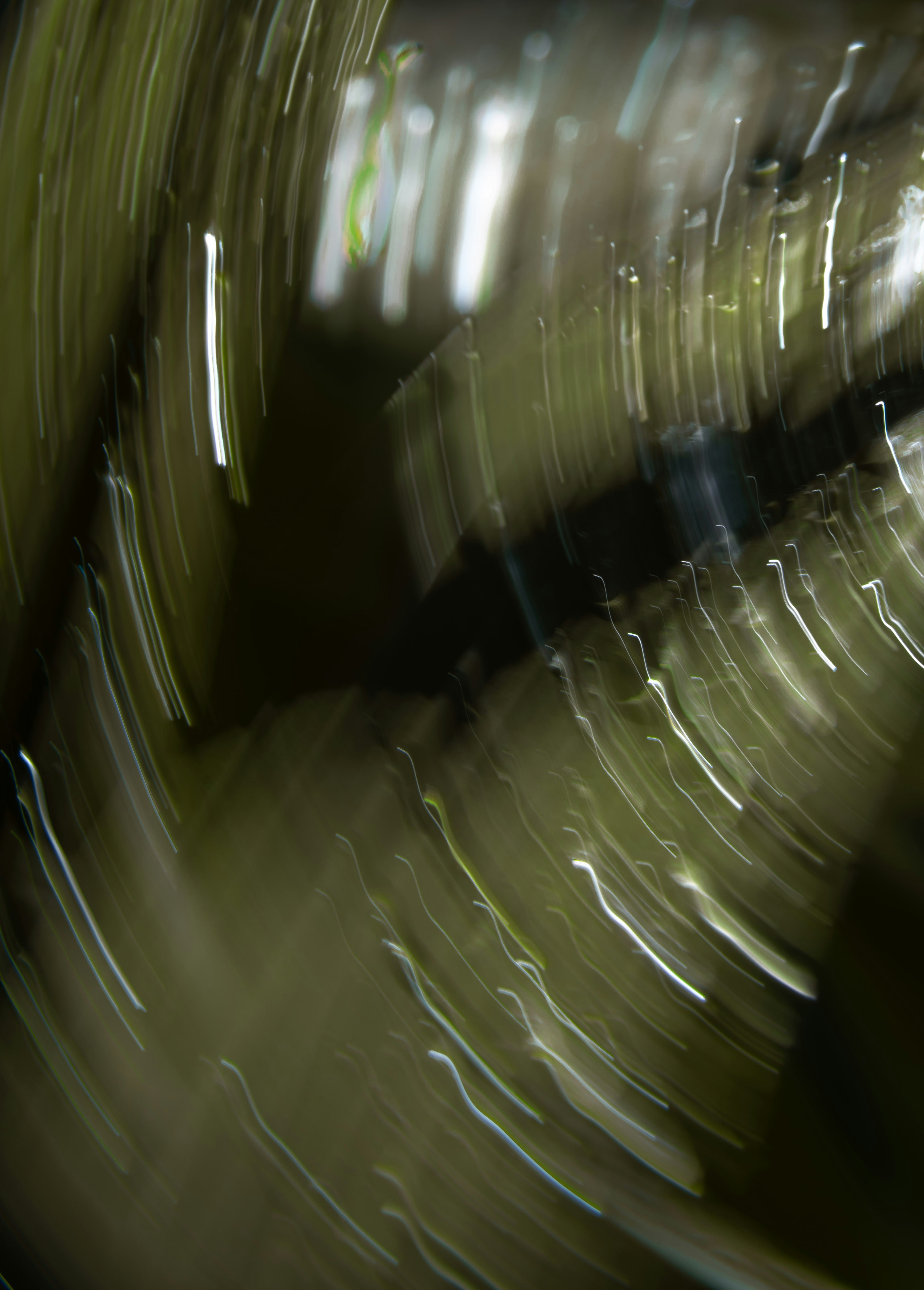 Spiral Light Trails in Motion-Blur Abstraction