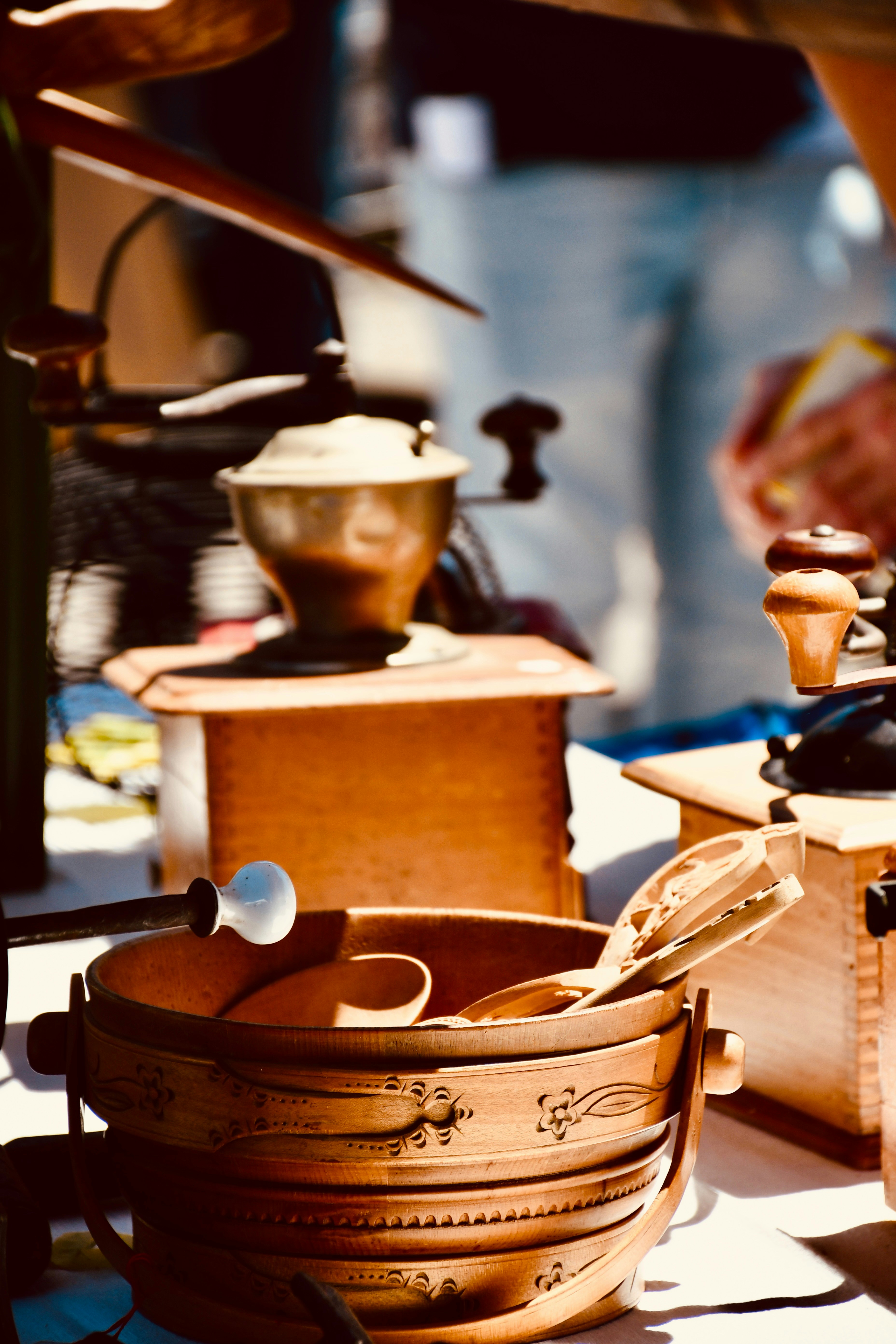 Handmade Coffee Grinders in Warm Market Light