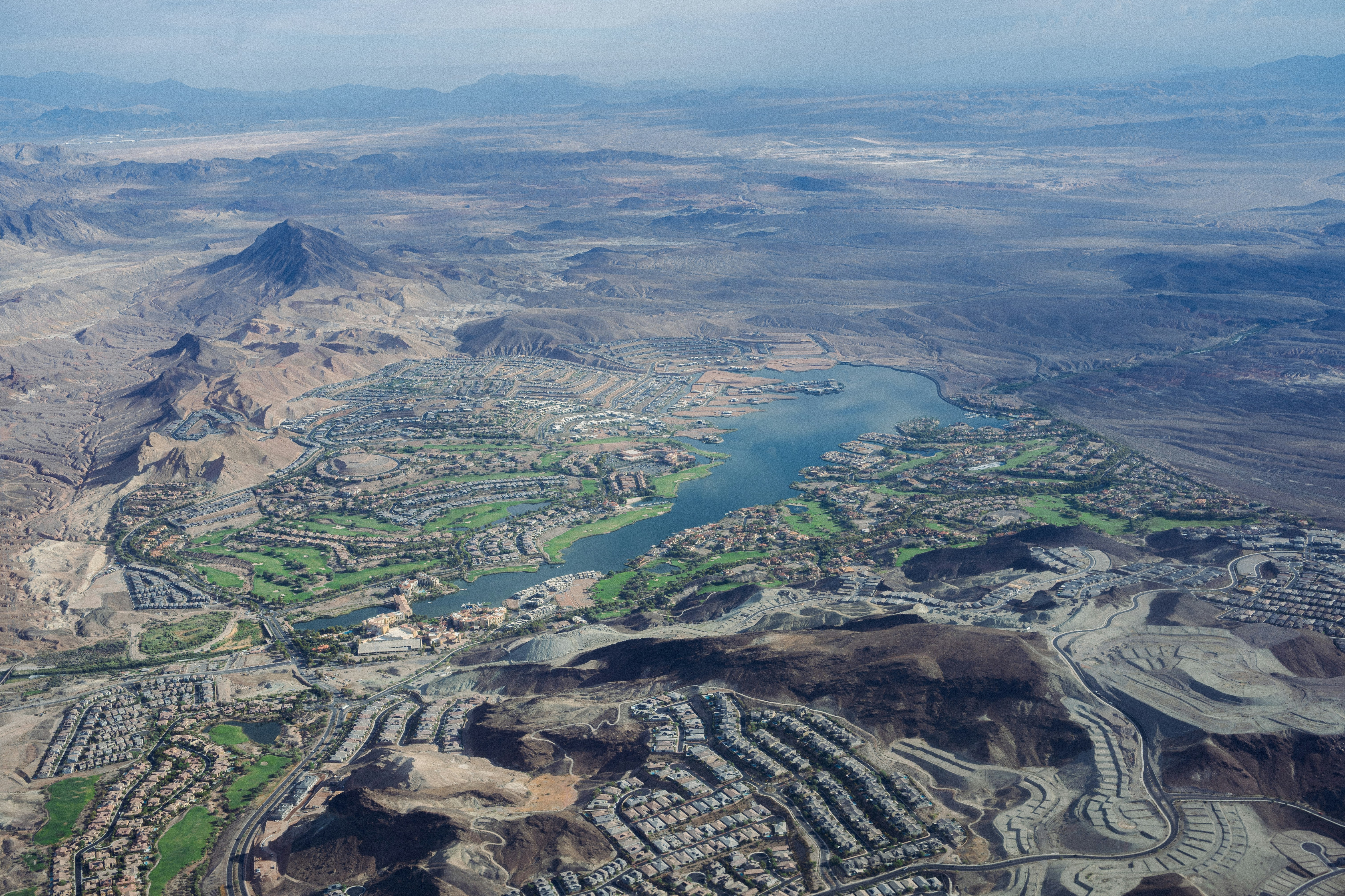 Terraced Oasis: Aerial contours around a winding river valley