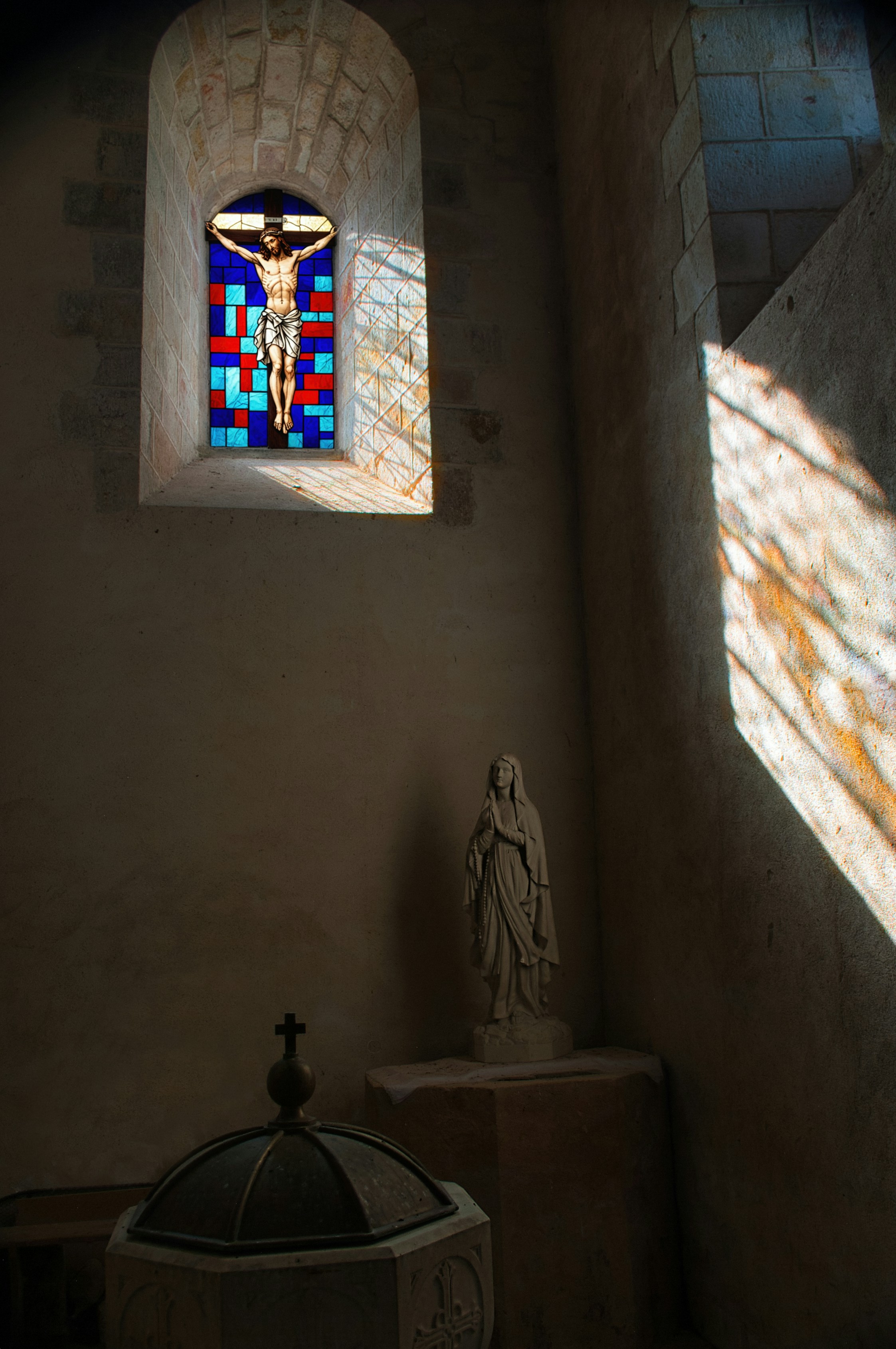 Stained Light over the Crucifix: A Quiet Chapel Ascending