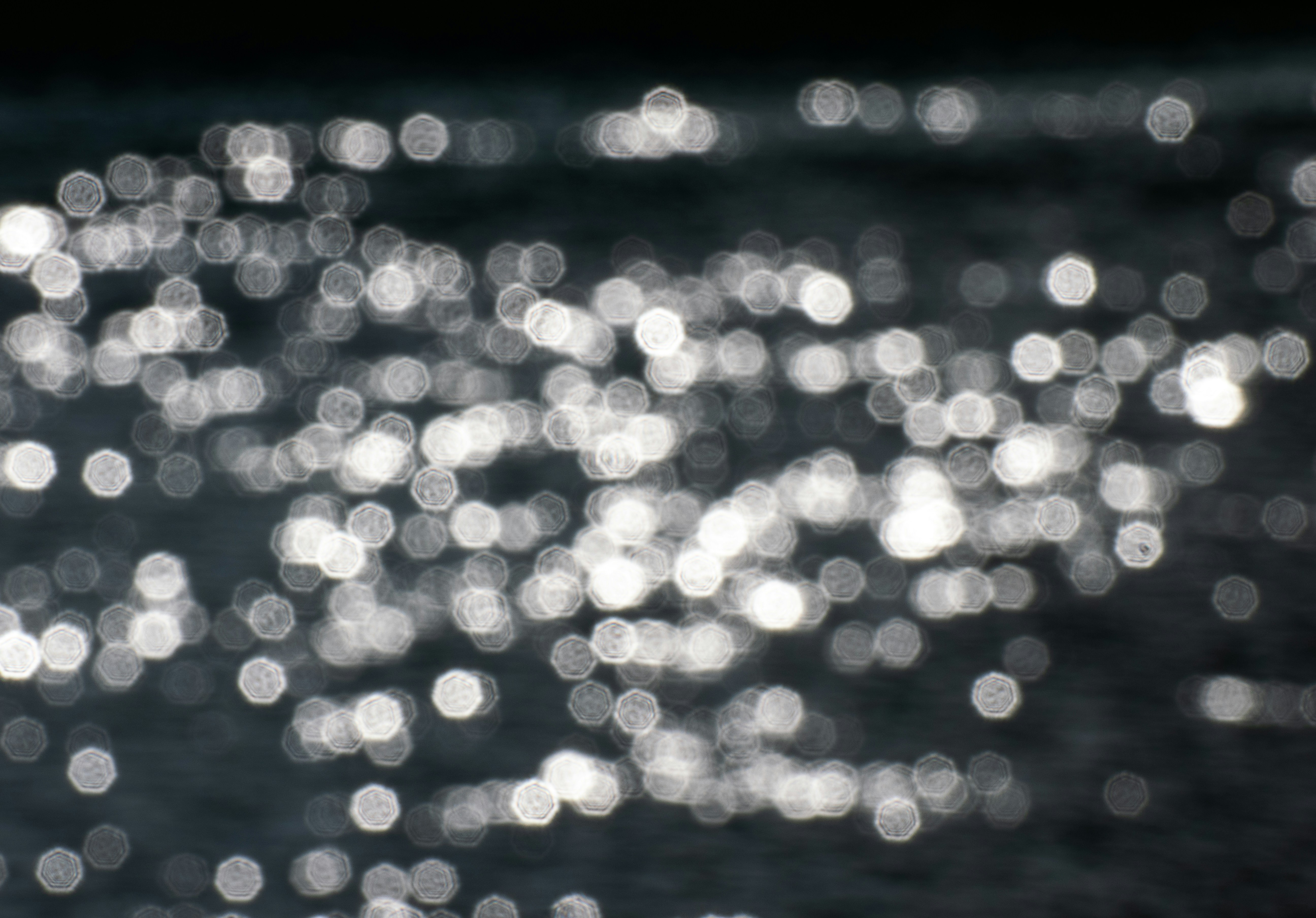 Bokeh Mosaic on Glimmering Water