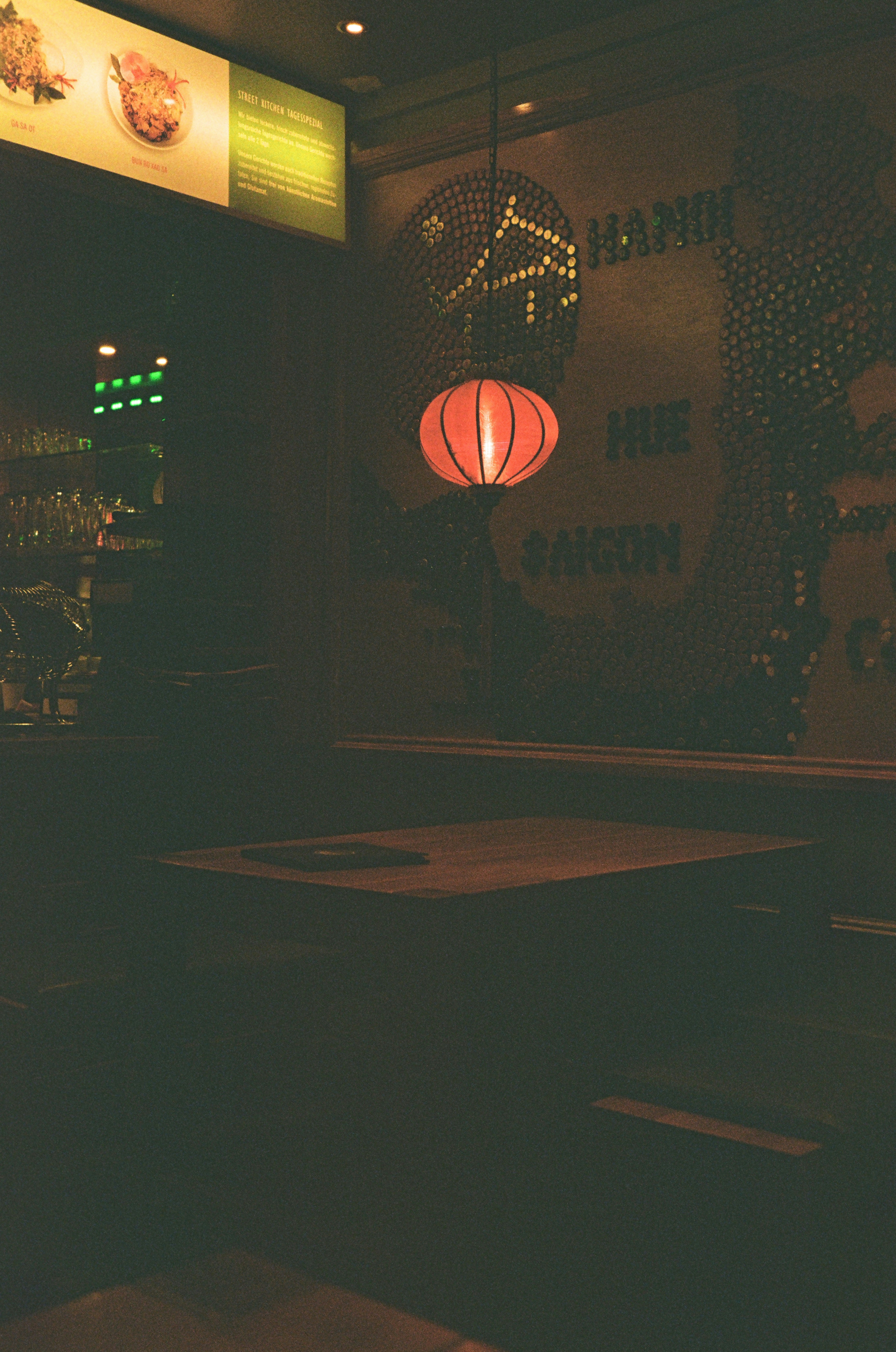 Red Lantern in a Quiet Asian Eatery at Dusk
