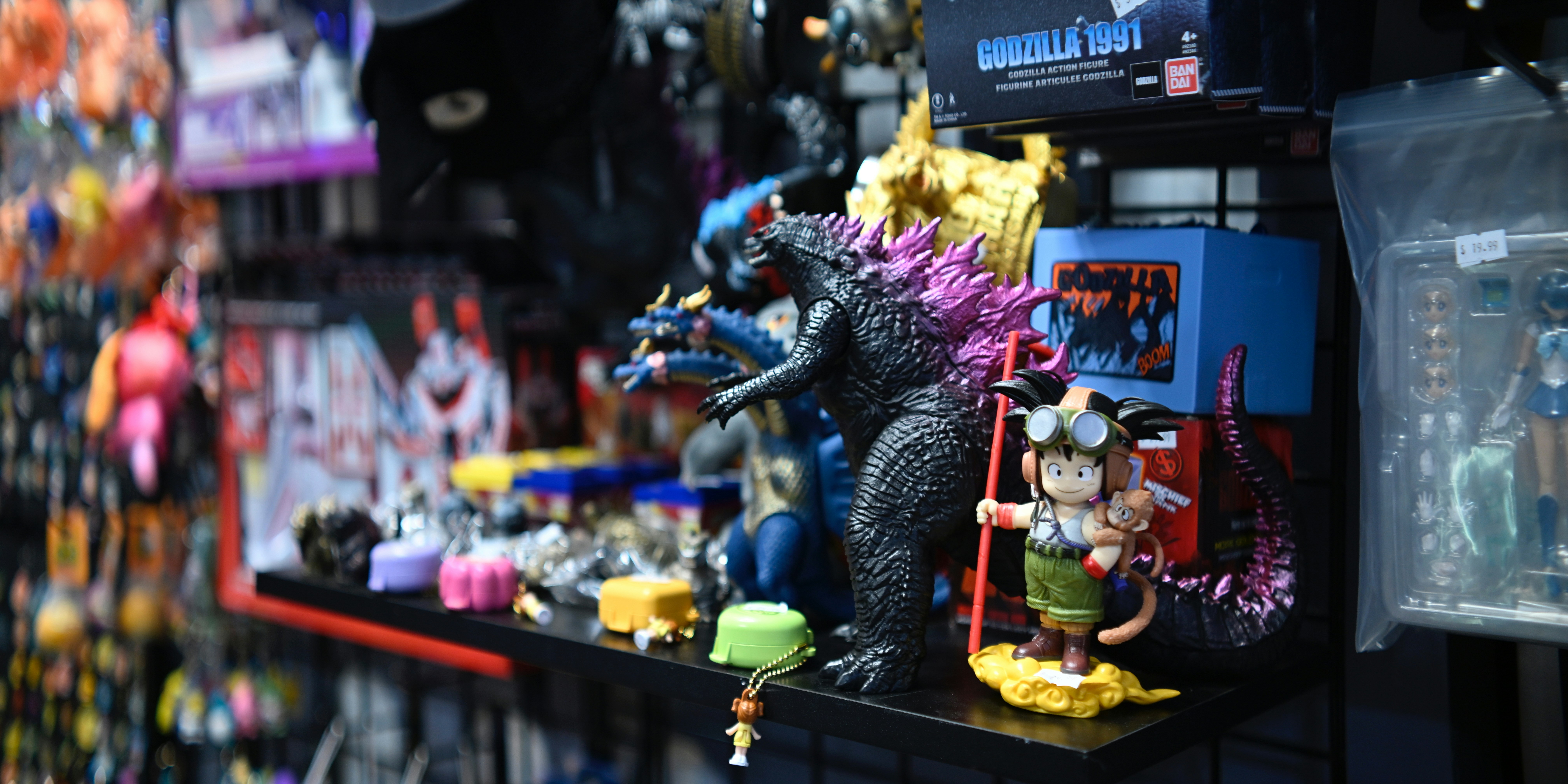 Dragon Figurine Parade: A Row of Toys in a Toy Shop Display