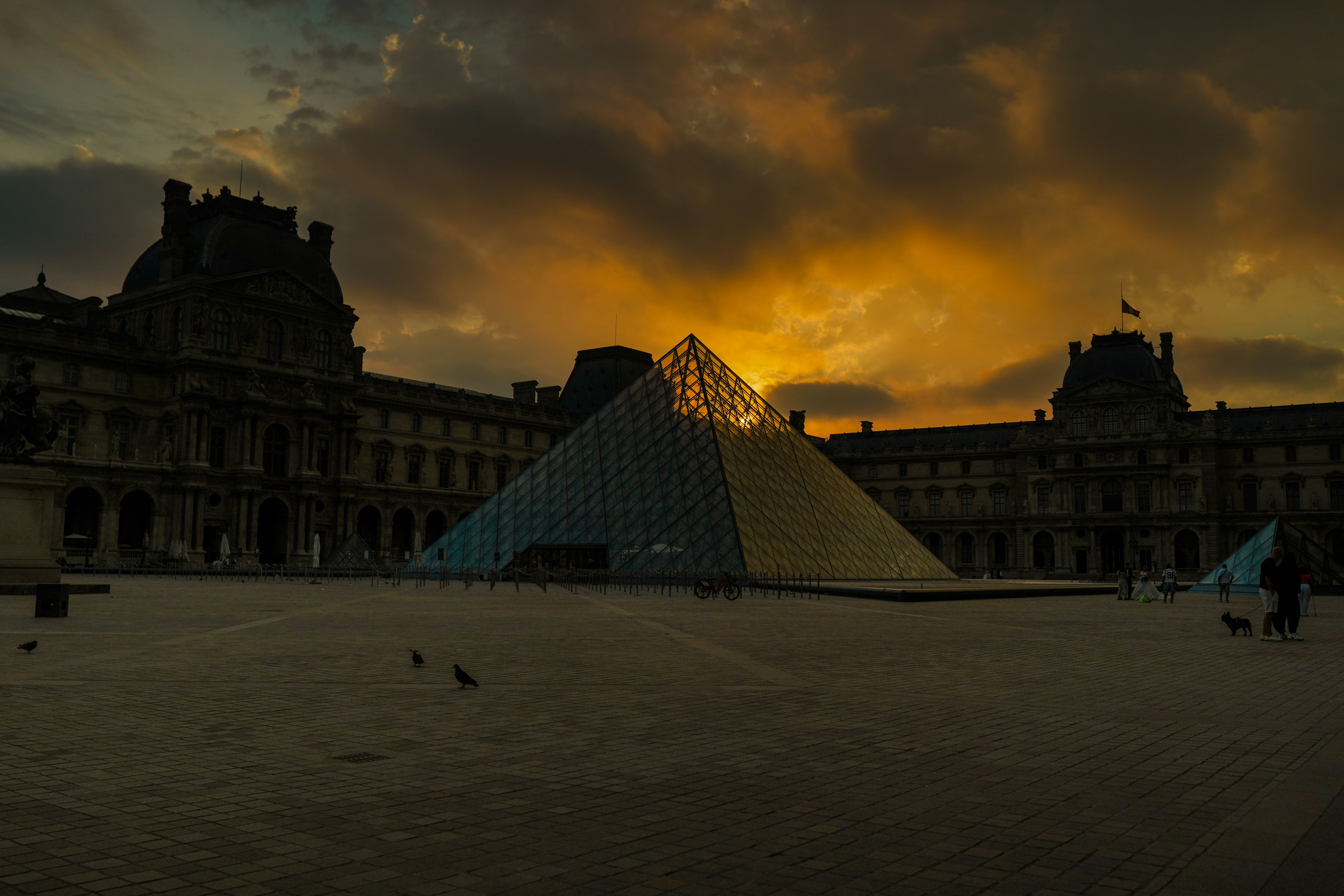 Sunset Over the Louvre: The Pyramid Amidst a Stilled Court