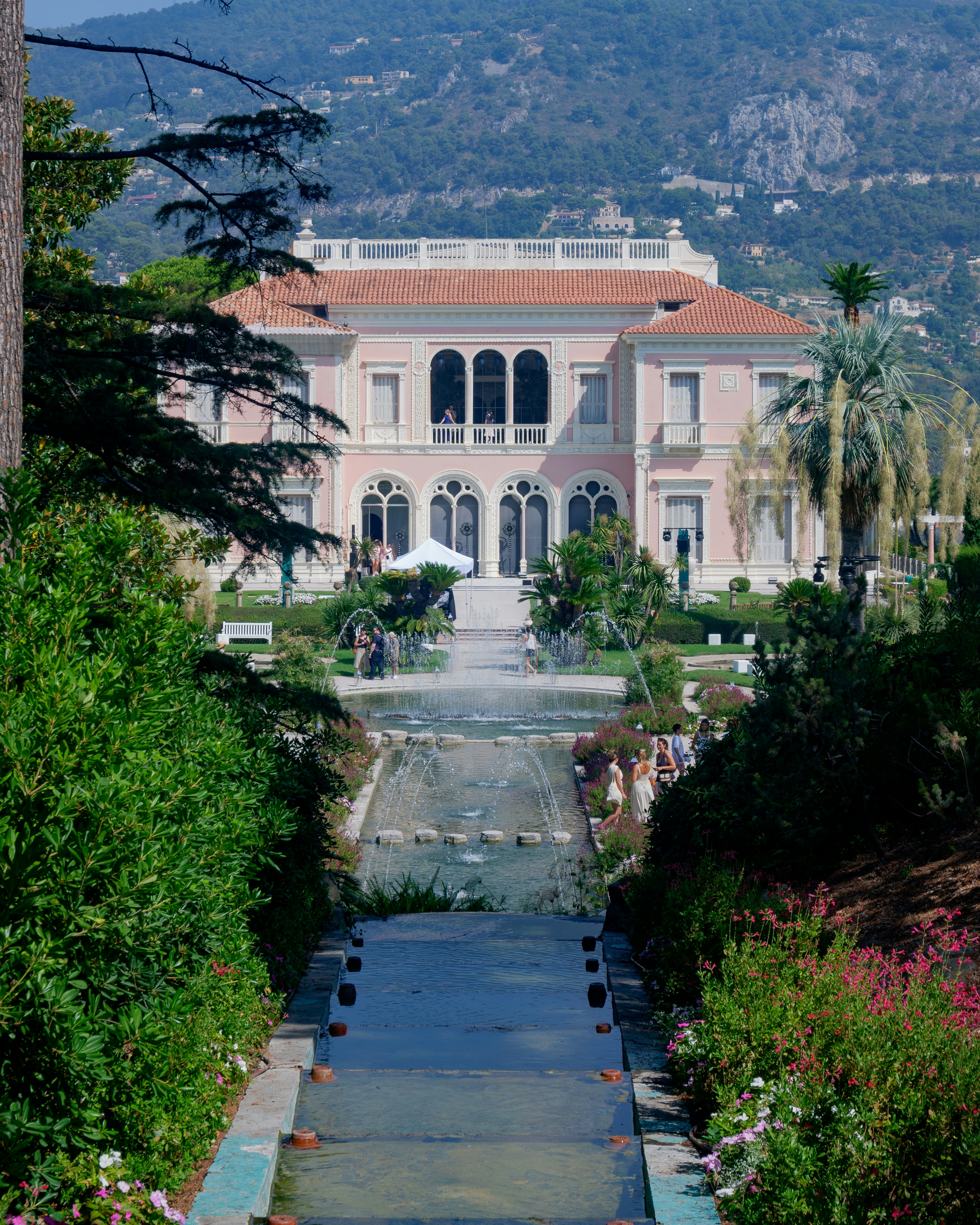 Villa in Bloom: Symmetry, Fountains, and a Pink Estate