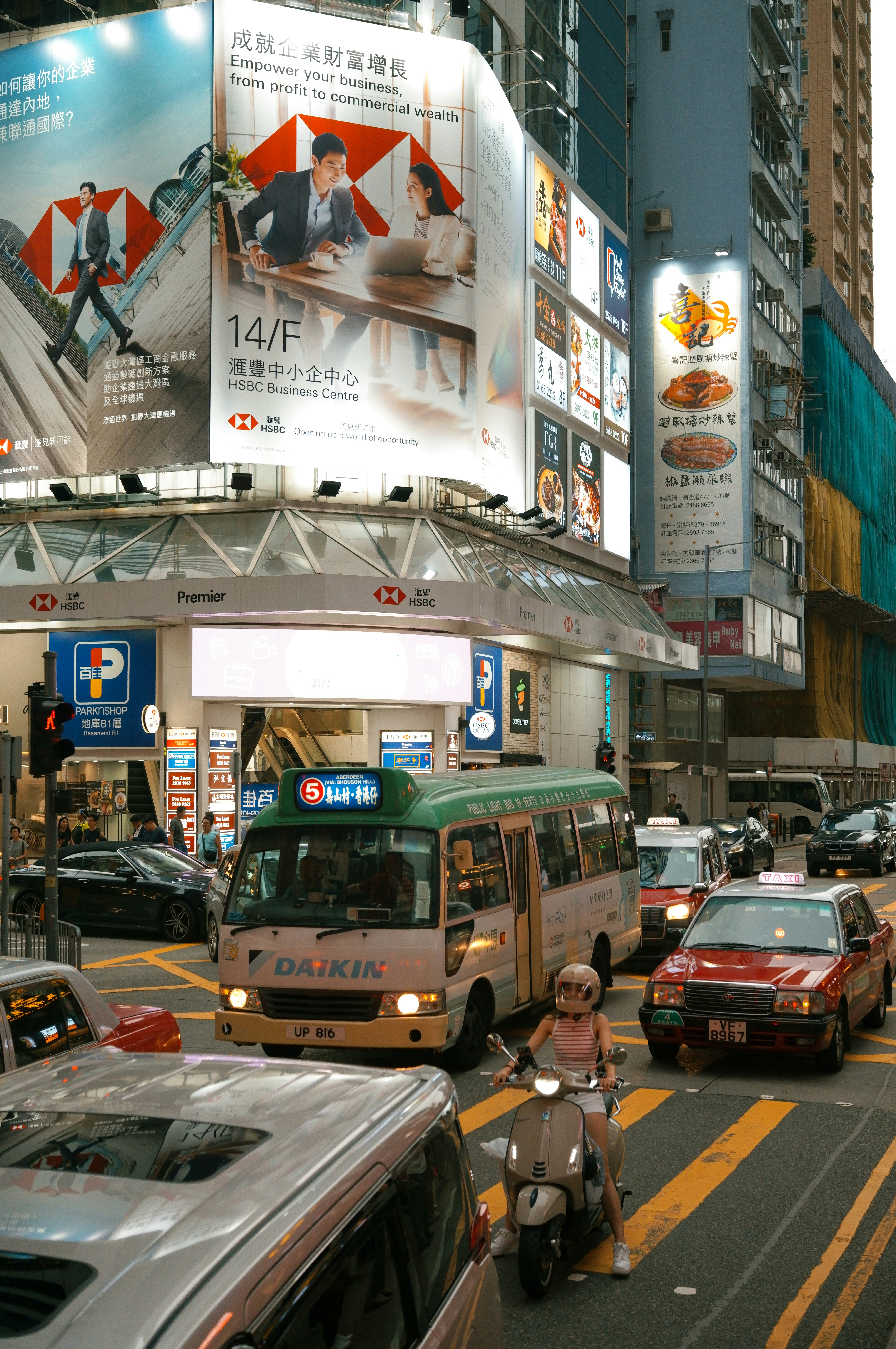 Lanterns of Traffic and Billboards: A Neon City Street in Motion