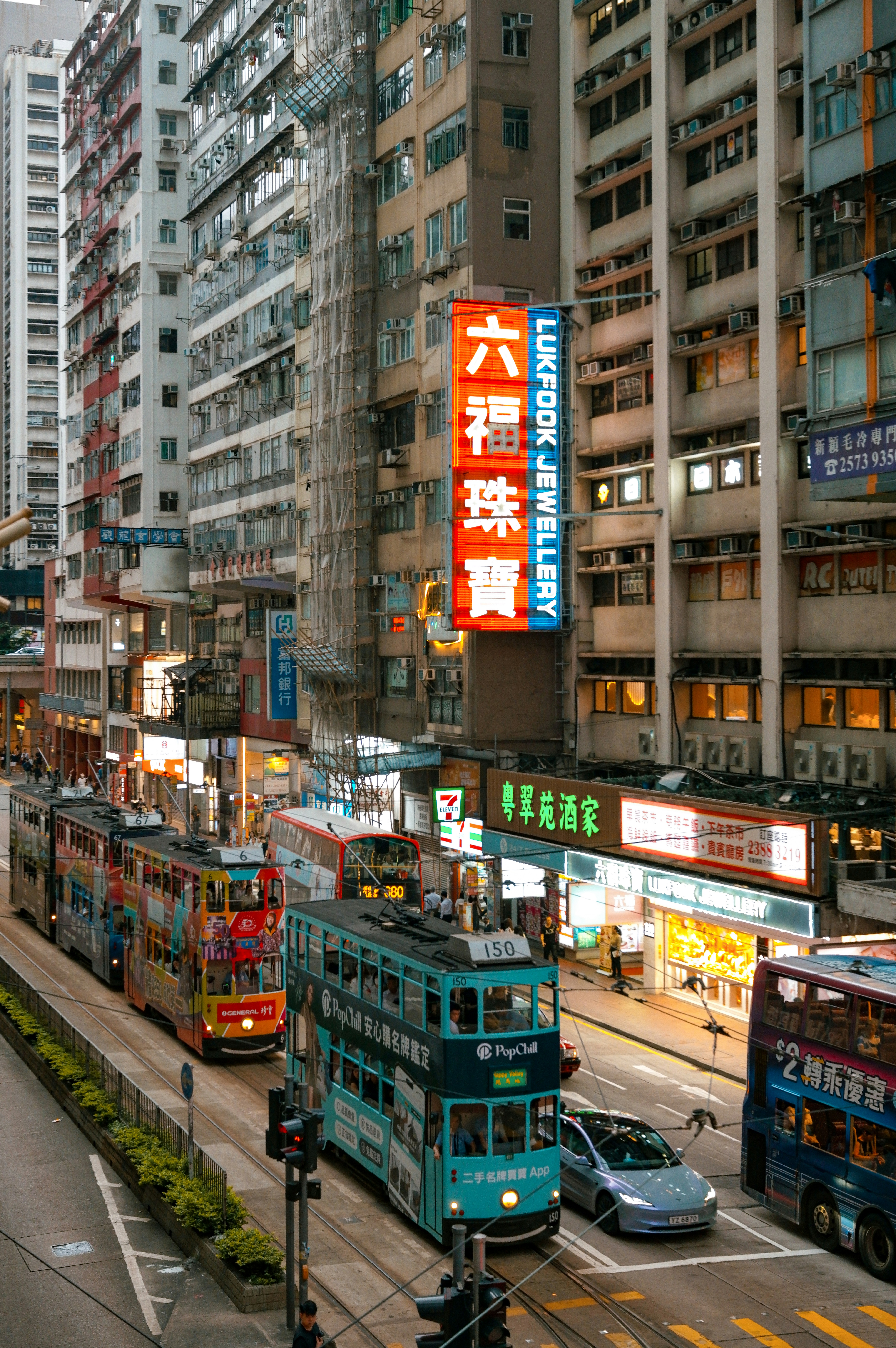 Neon City Pulse: Aerial View of Busy Kowloon Streets