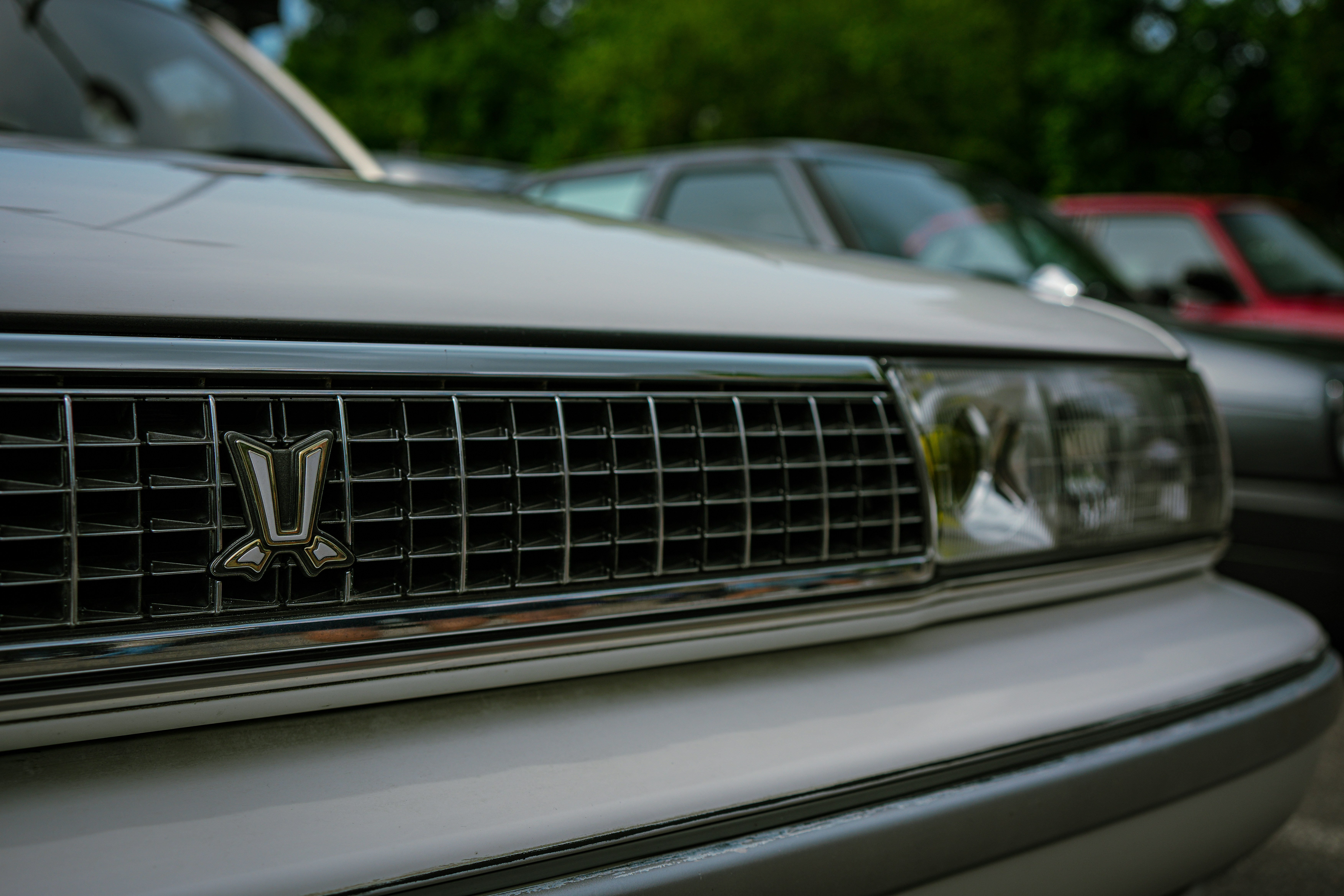 Chrome Grille in Focus: A Closer Look at a Classic Car Front