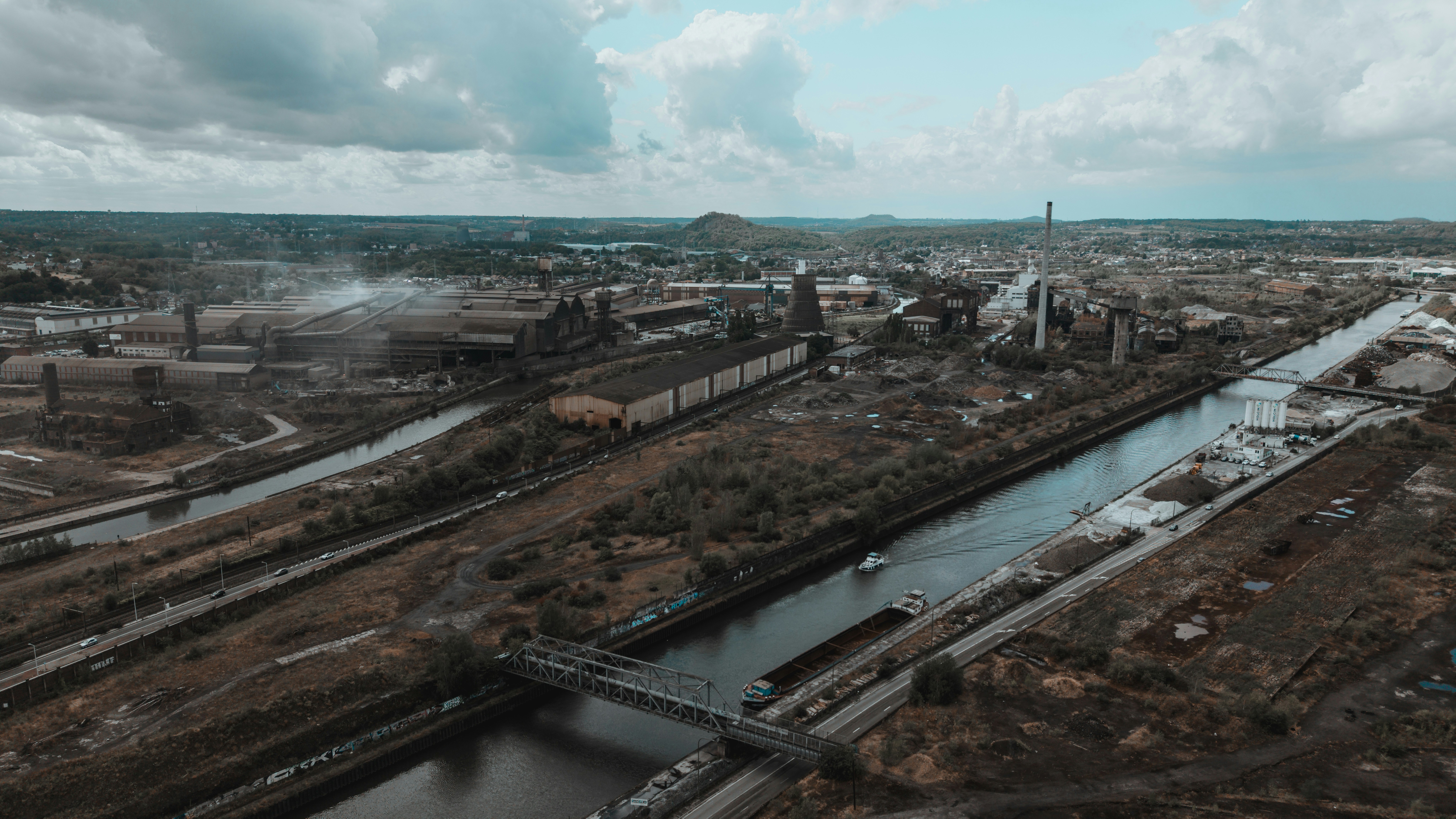 Industrial Channel and Bridge: Aerial View of a Restored Waterway Corridor