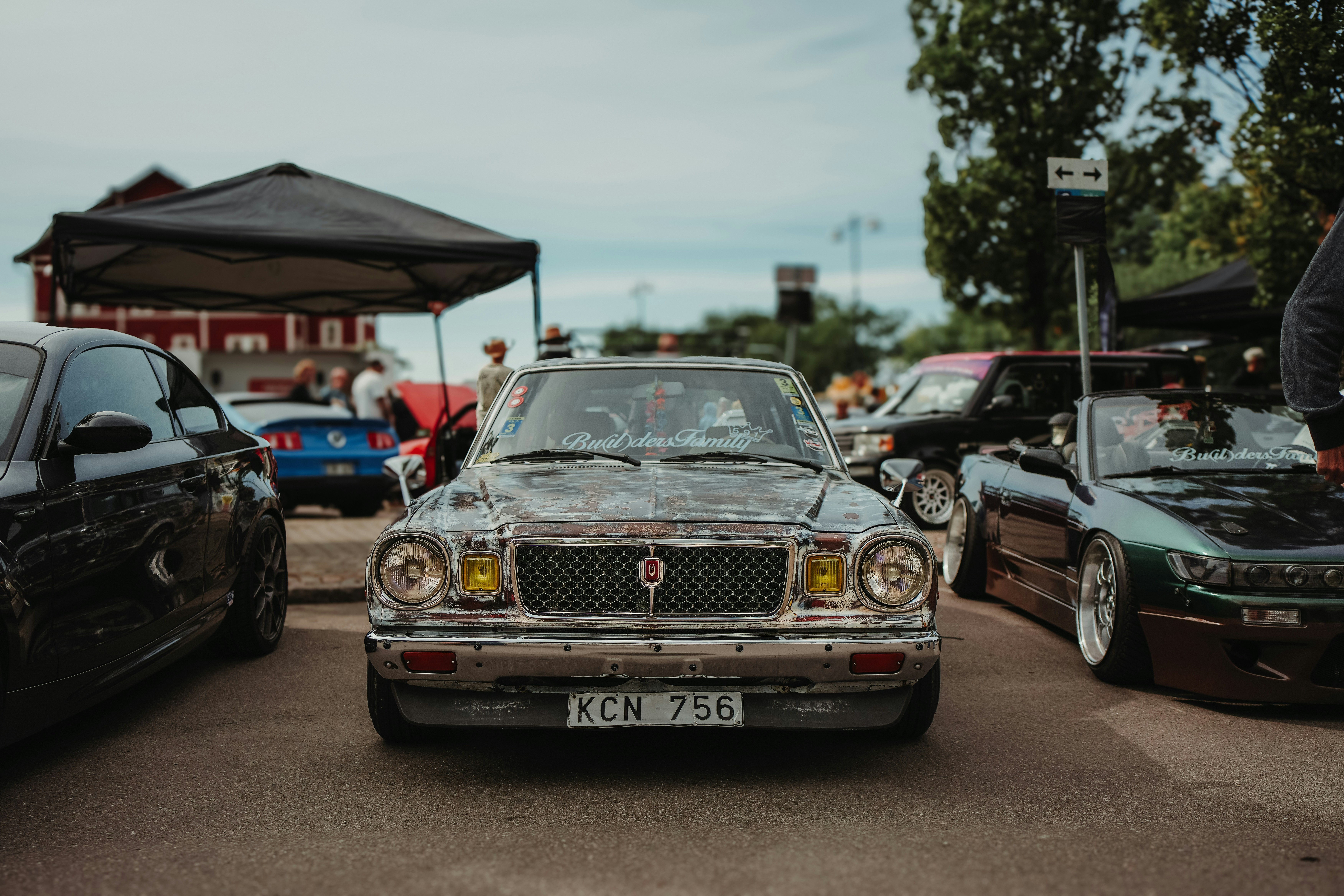 Chrome Crown: A Classic Car Lineup at Dusk