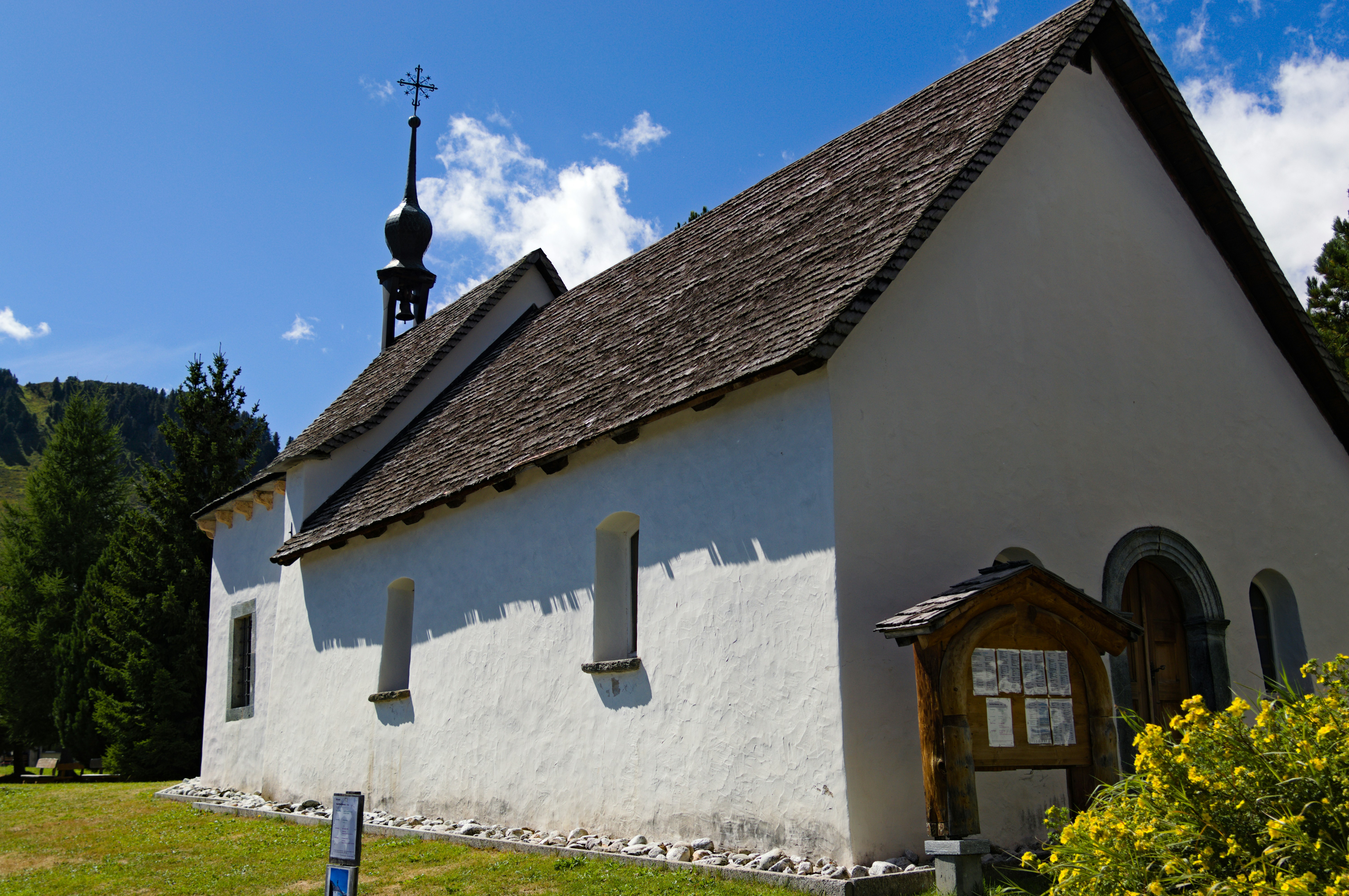 Chapel in Stitched White: A Quiet Alpine Shrine