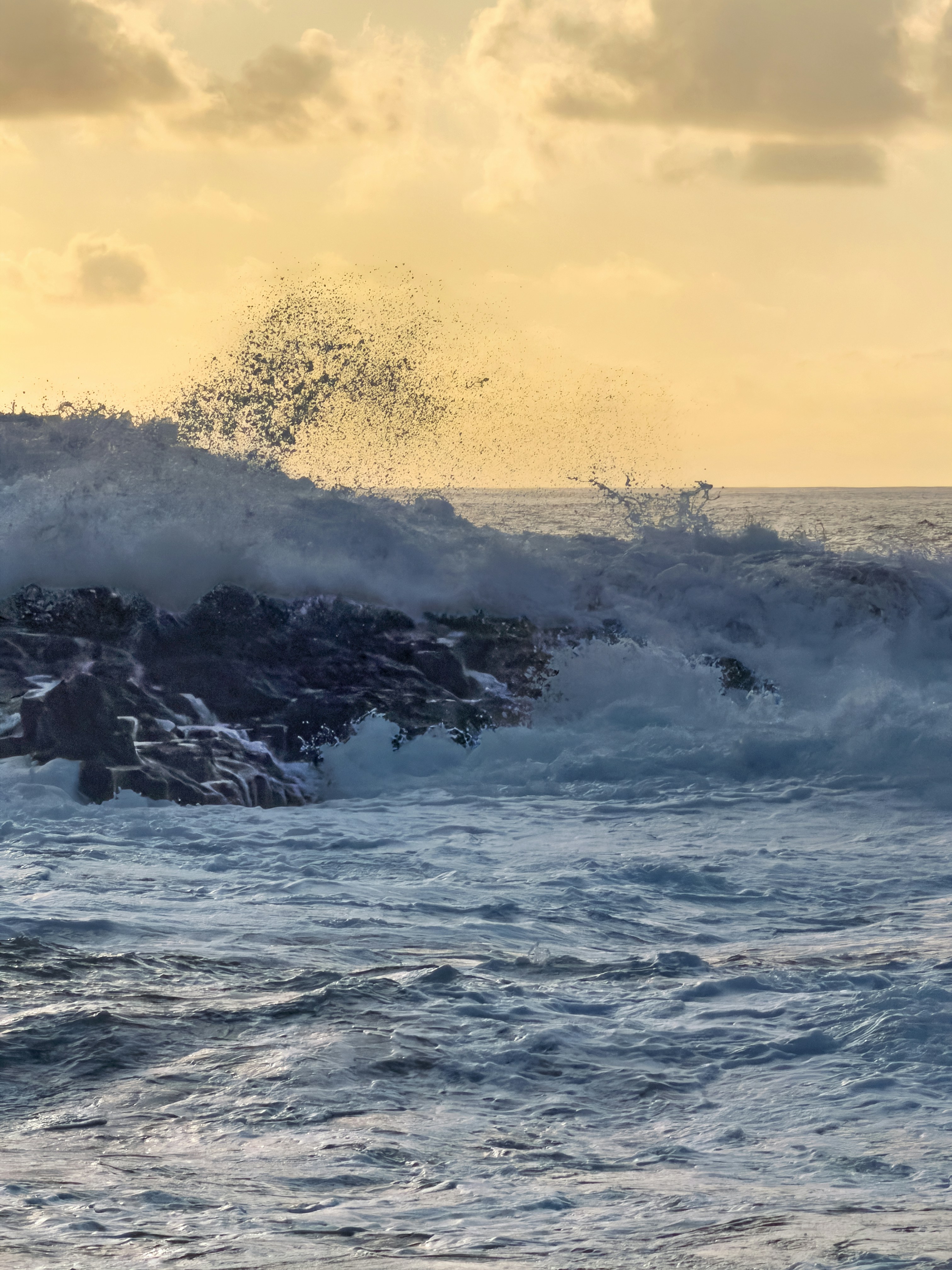 Sunlit Crest: Ocean Breakers at Dusk