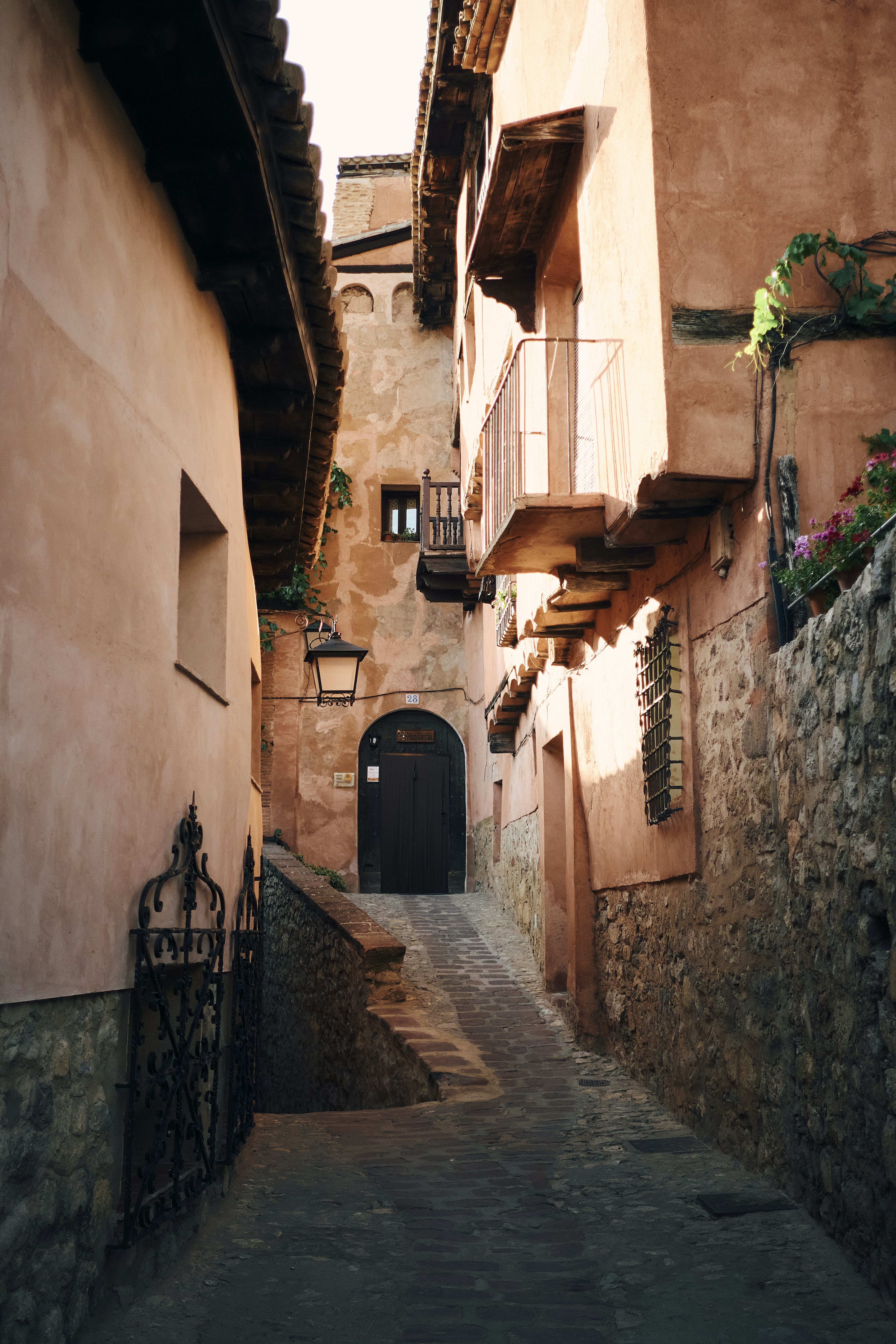 Muted Streets of Terra Cotta: A Quiet Staircase toward a Dusk-Soft Door