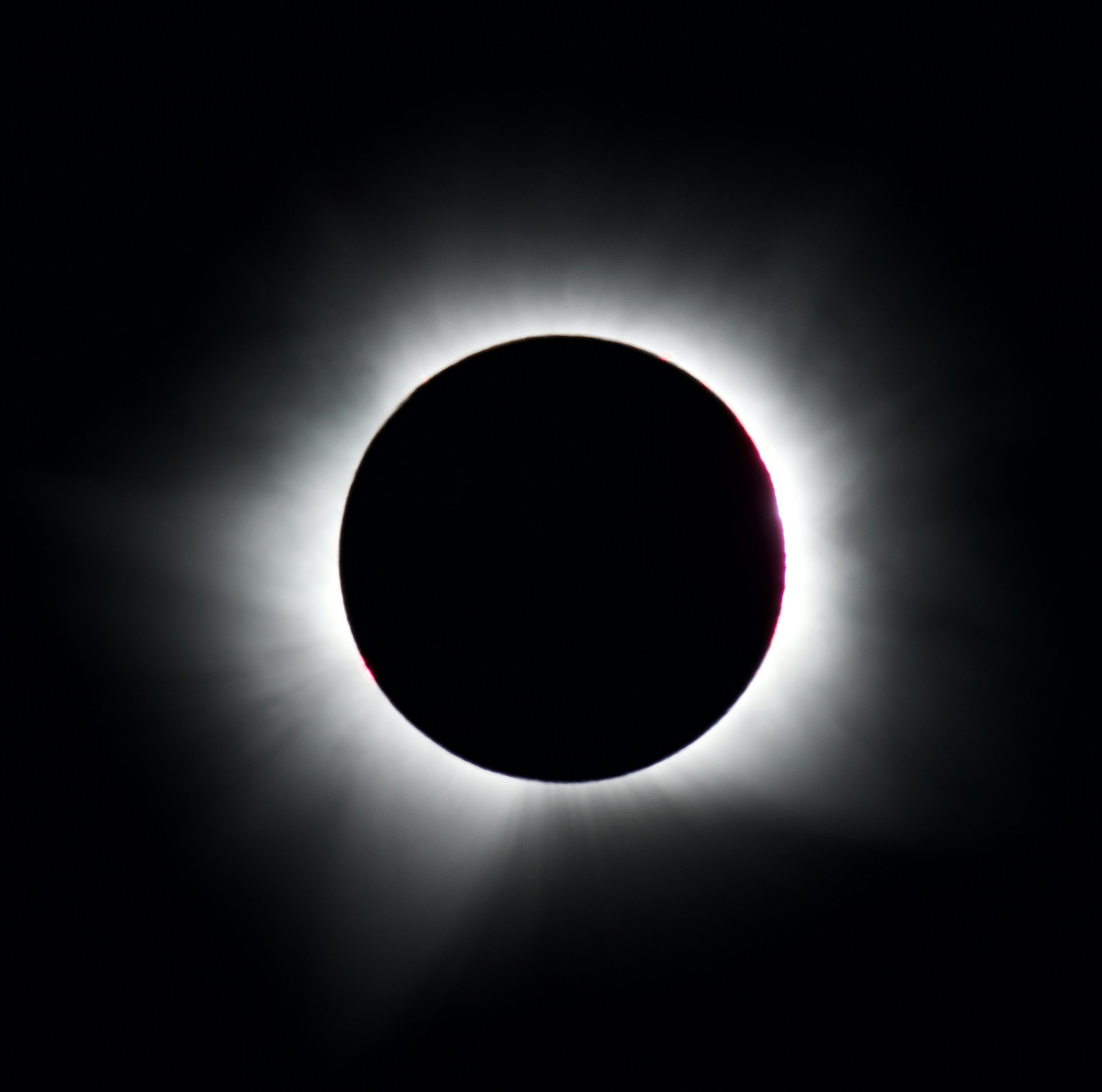 Solar Crown: An Eclipse’s Silent Ring Encircling the Black Disk