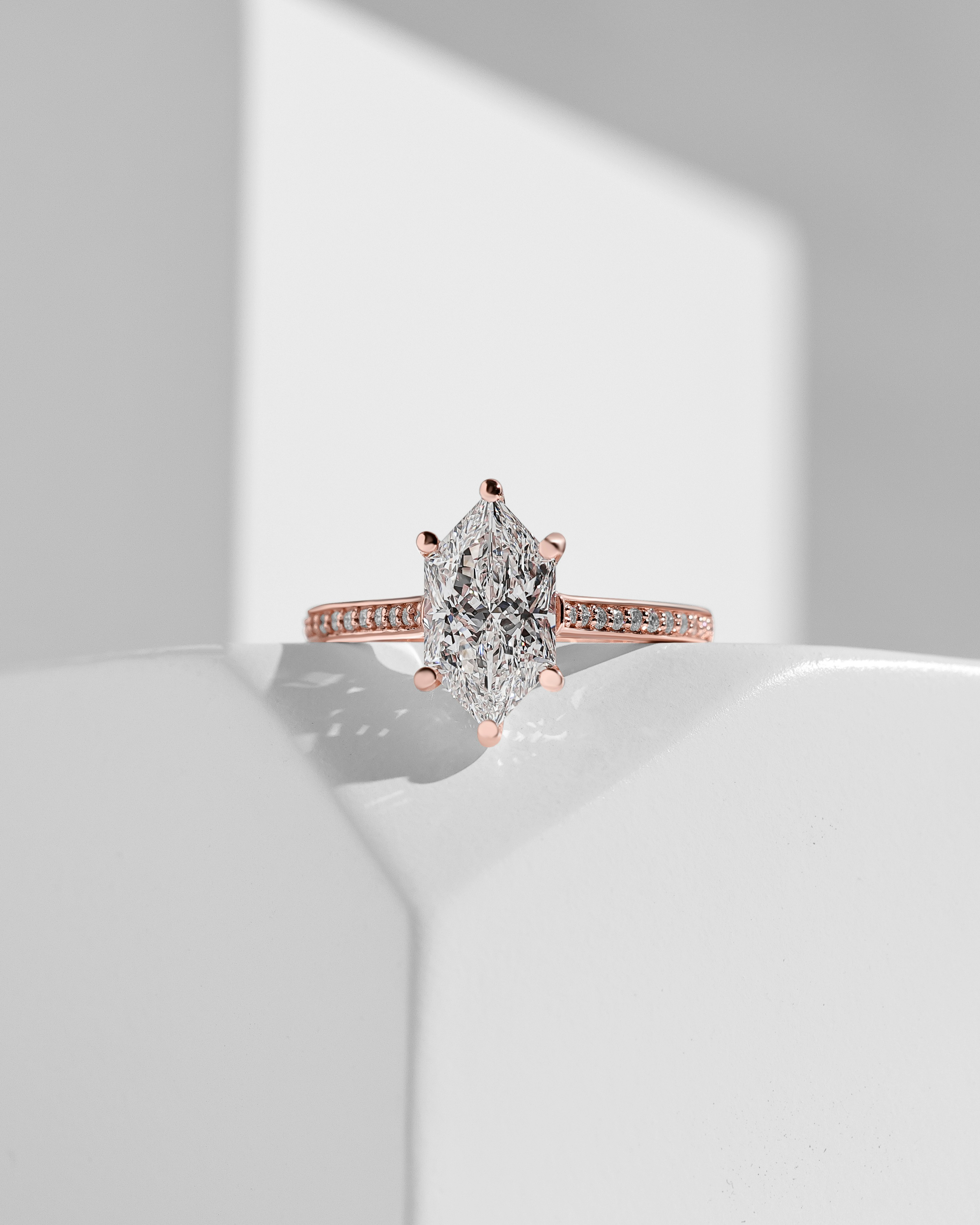 Rose-Gold Ring with Pear-Cut Diamond in Minimalist Studio Glow