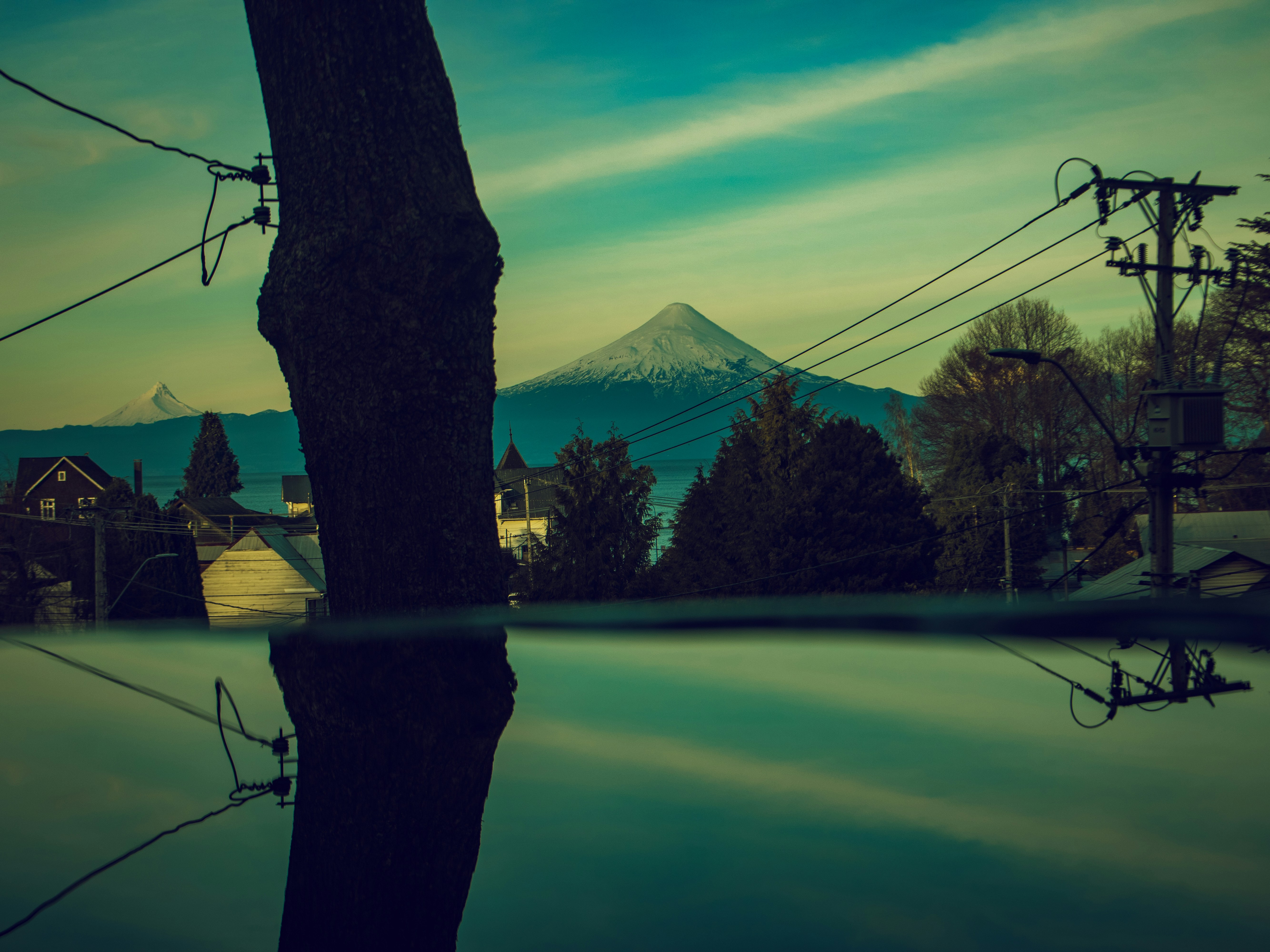 Twin Peaks over a Quiet Suburban Landscape