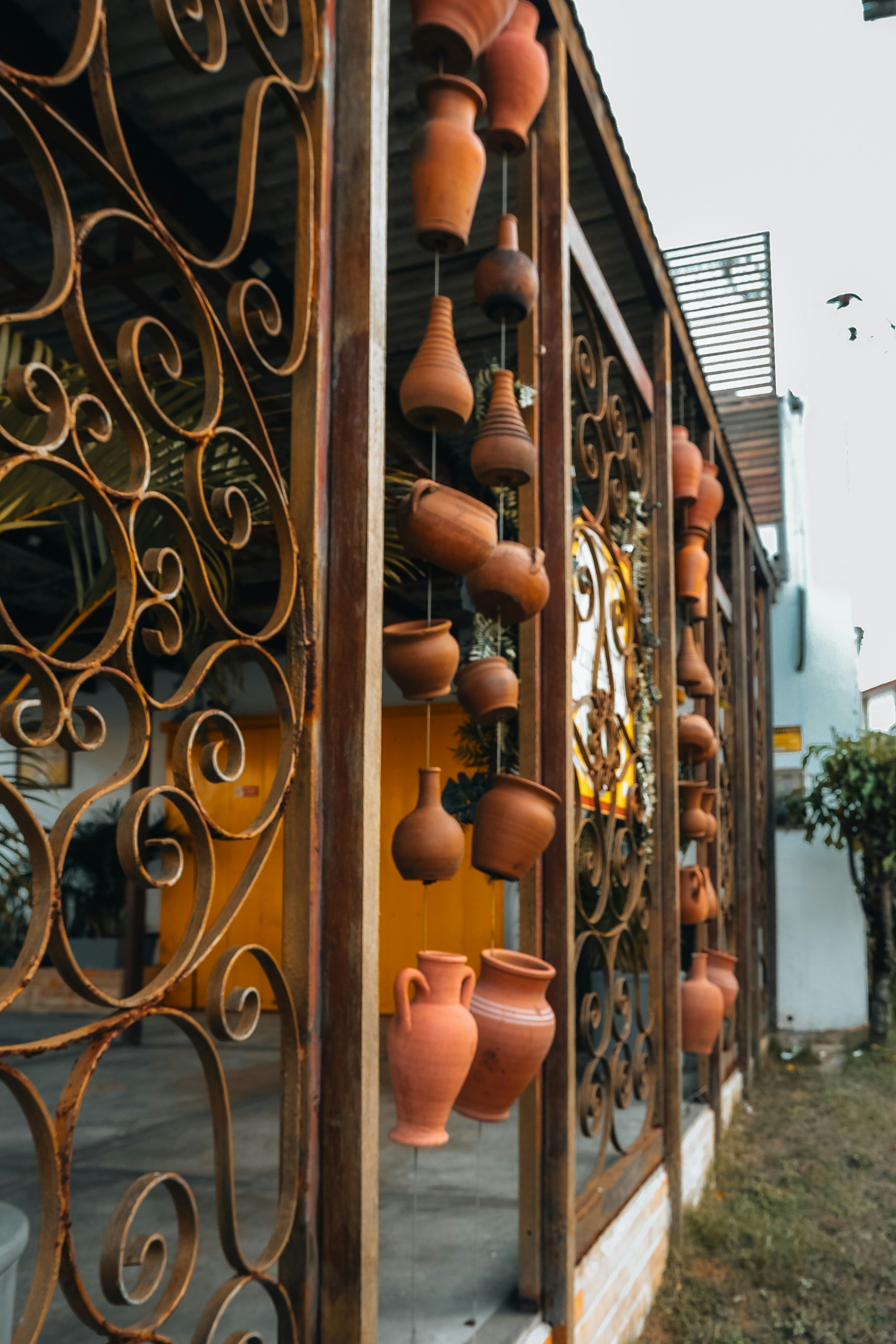 Terracotta Ornaments on an Iron Gate Corridor