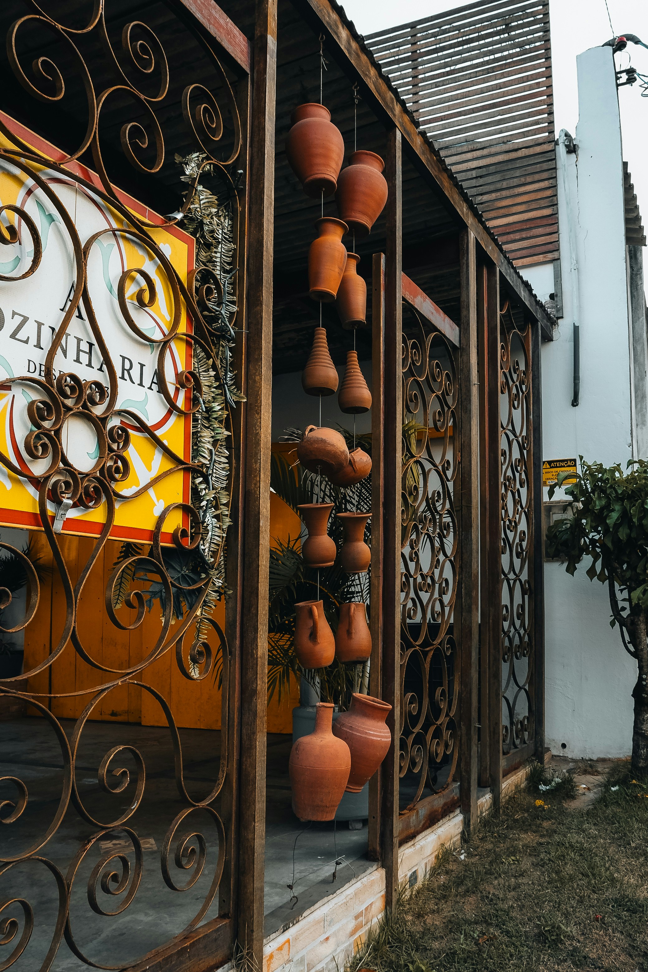 Terracotta Ornaments Framing a Wrought-iron Passage