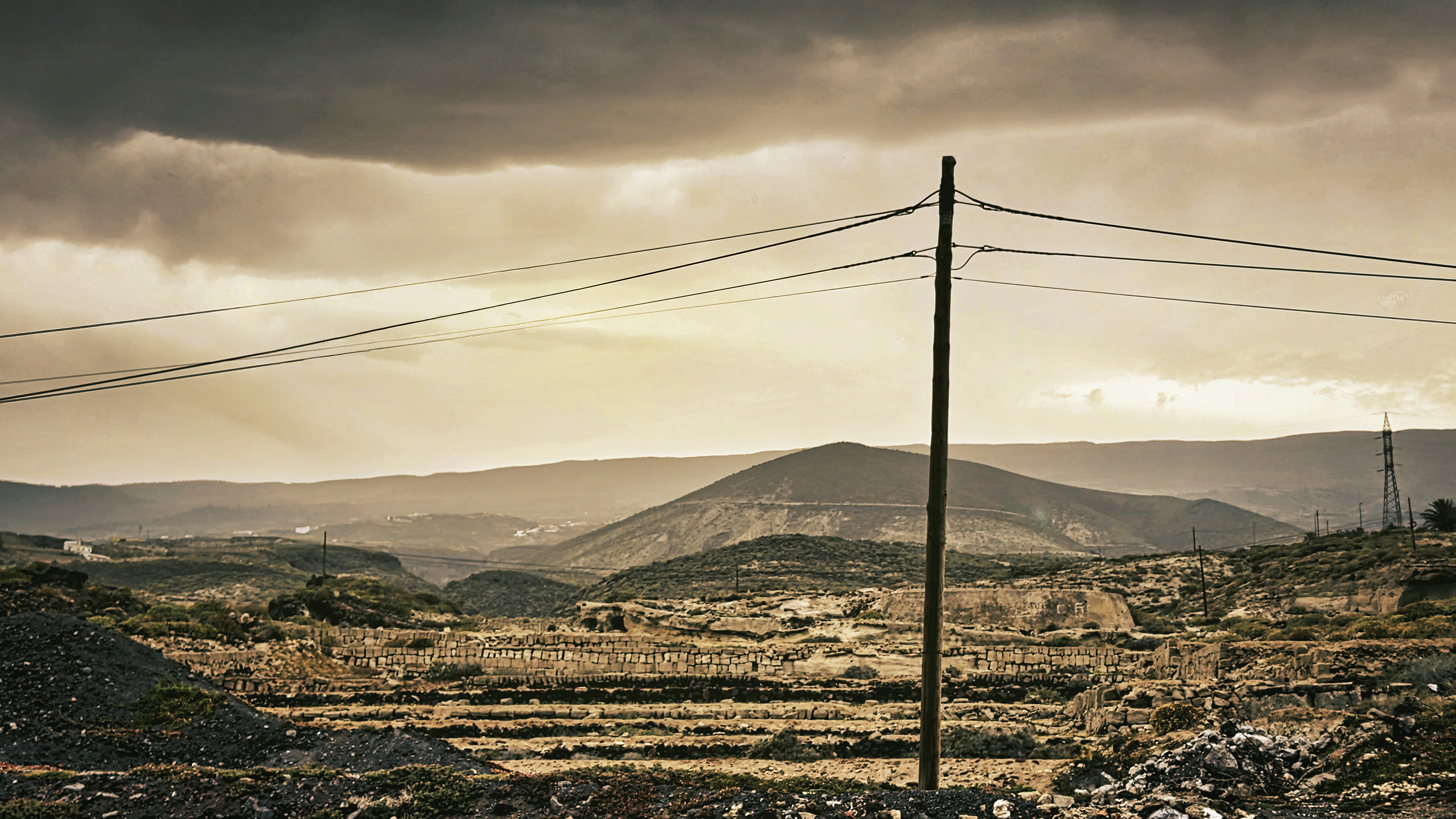 Desolate Horizon Under Stormlit Skies