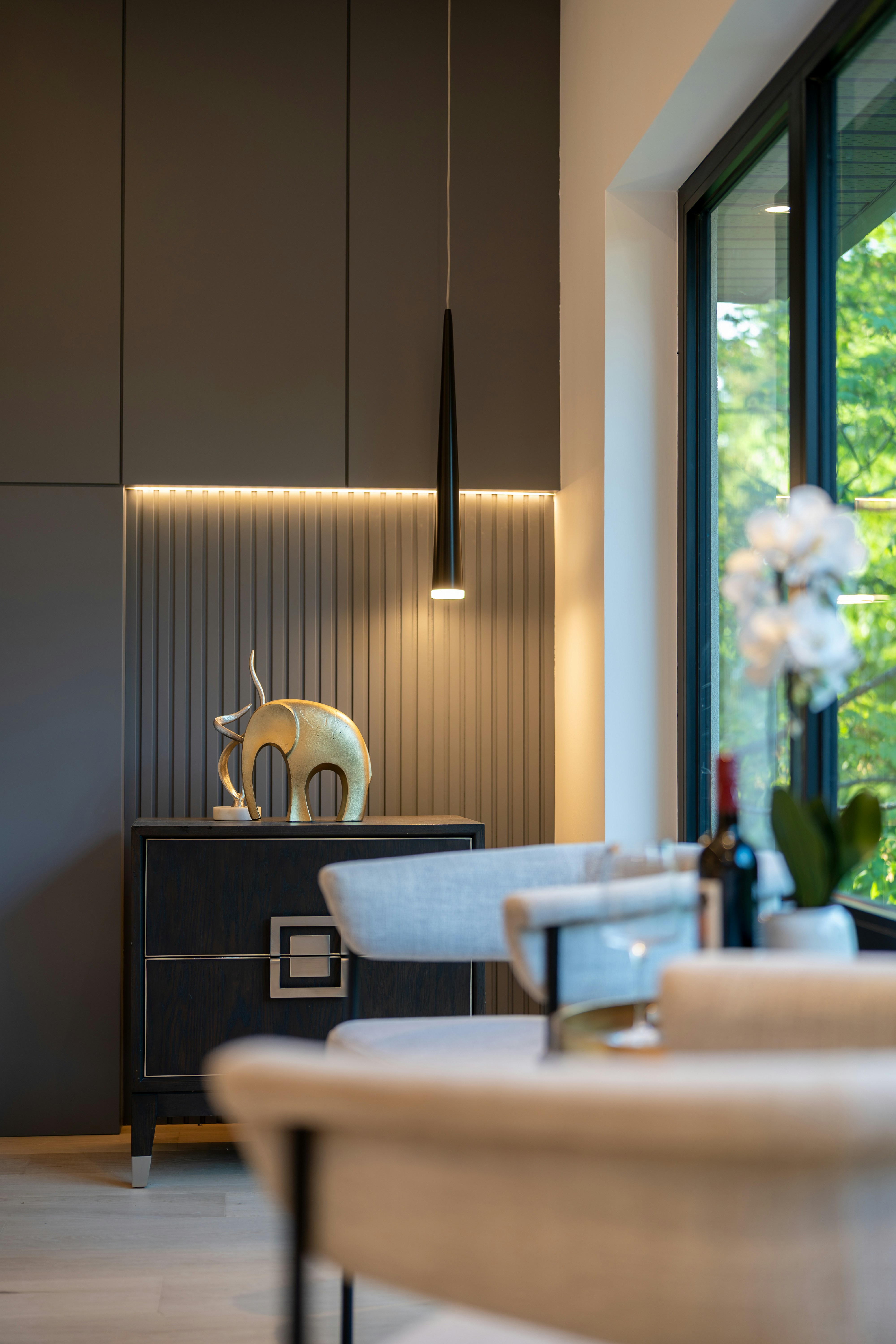 Minimalist Luster: A Modern Sideboard Under Subtle Glow