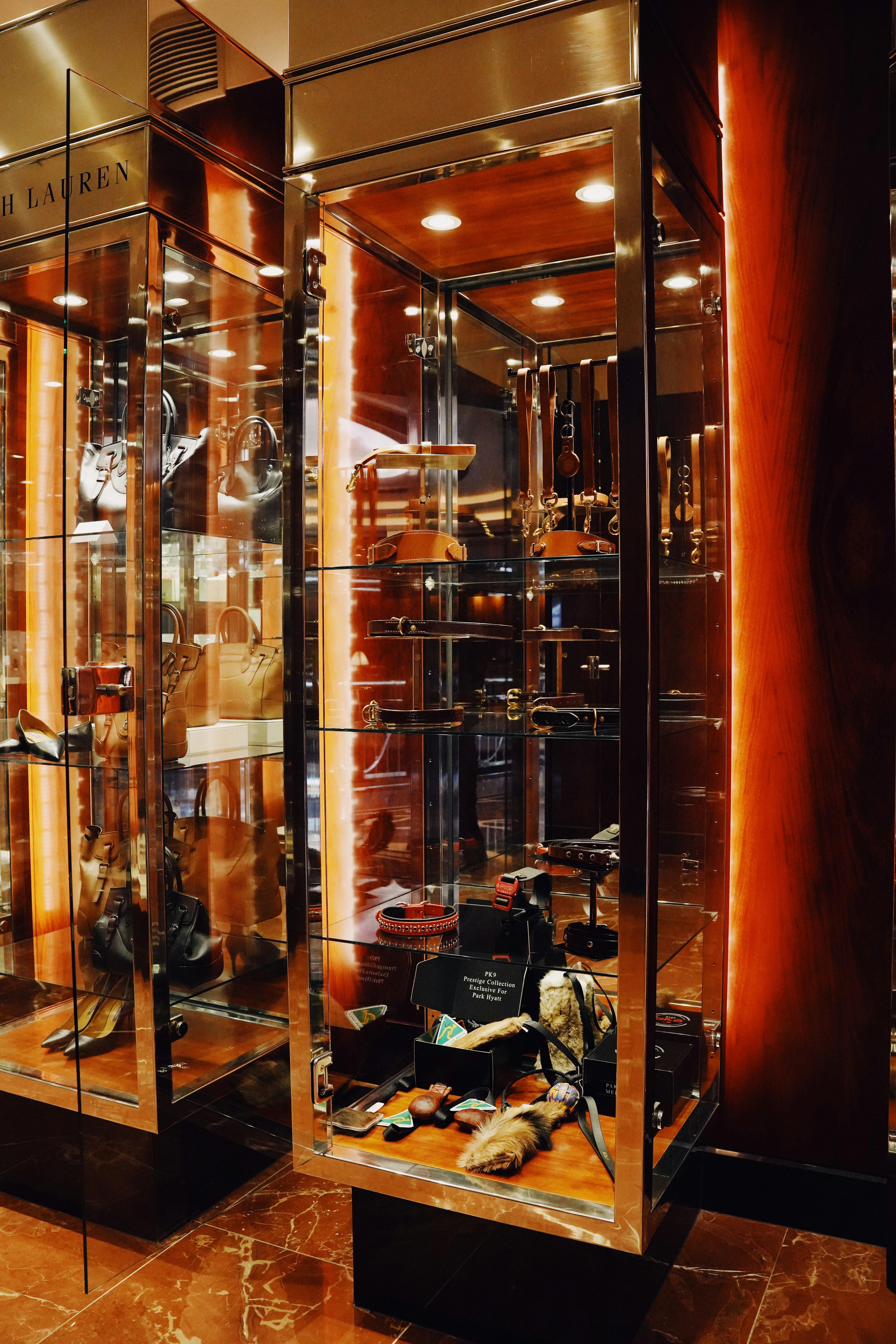 Gilded Display Cabinets in a Luxurious Retail Interior