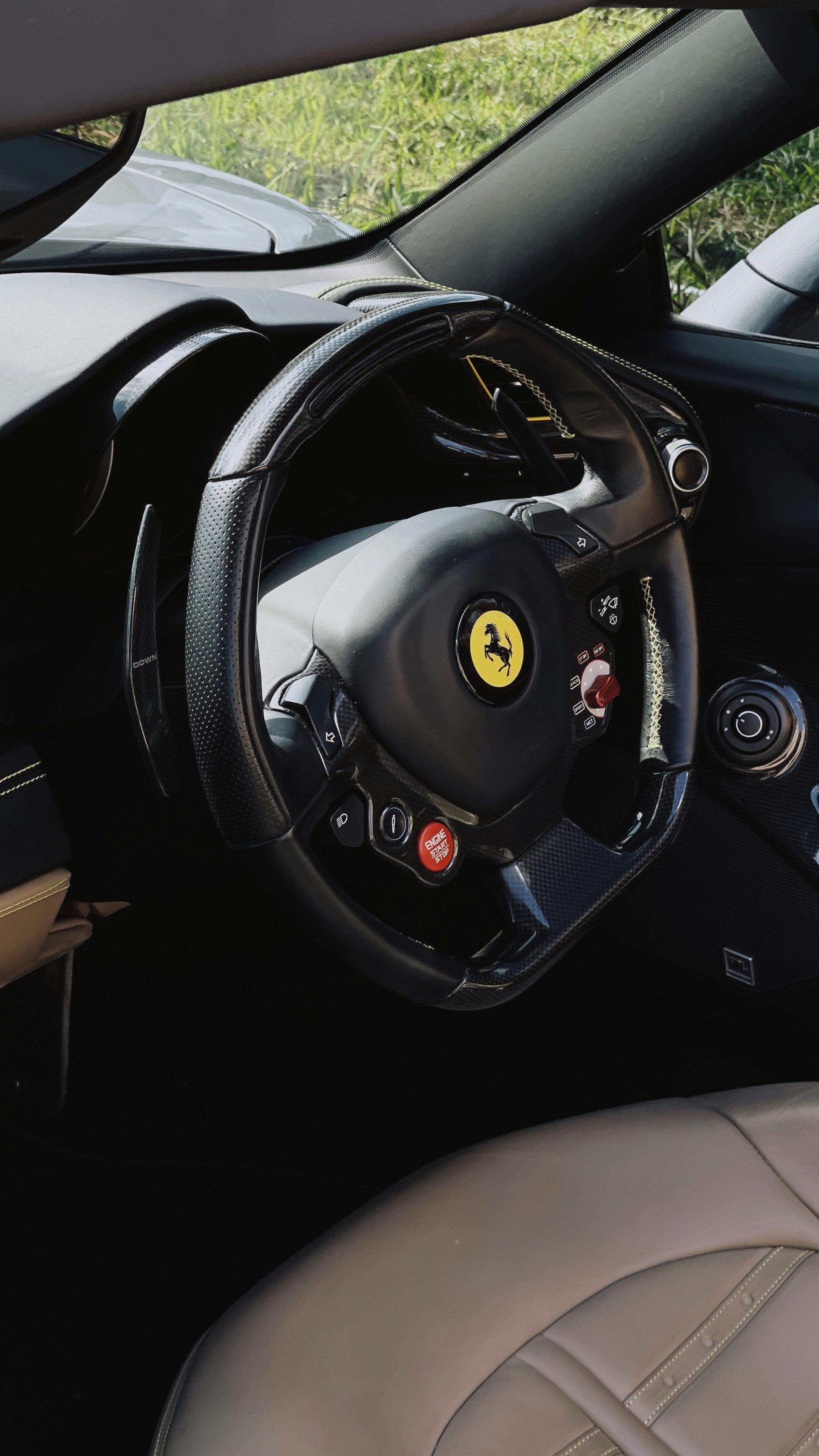 Ferrari steering glamour: close-up on the battle-ready wheel
